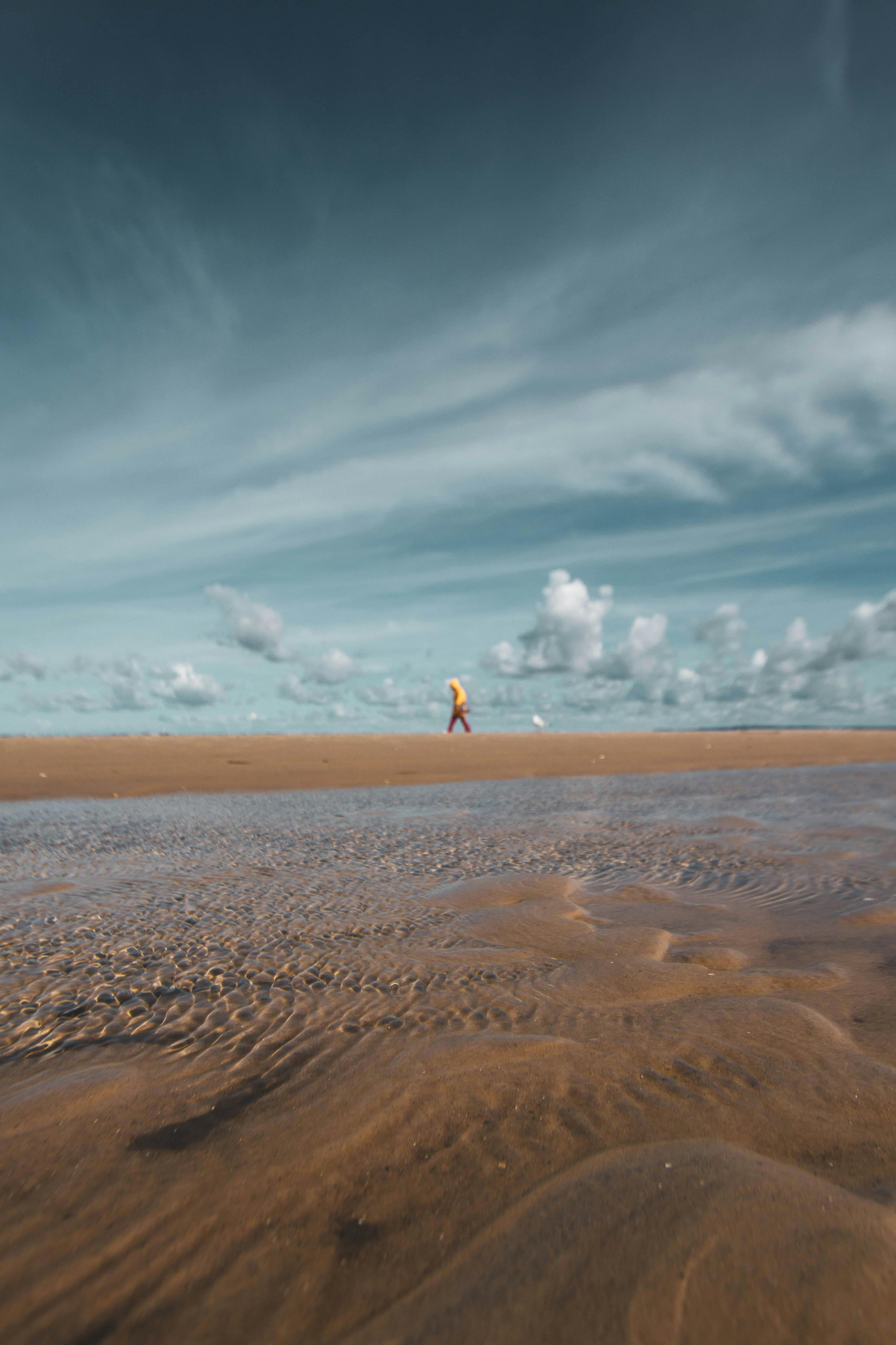 Person Floating on Water at Daytime · Free Stock Photo