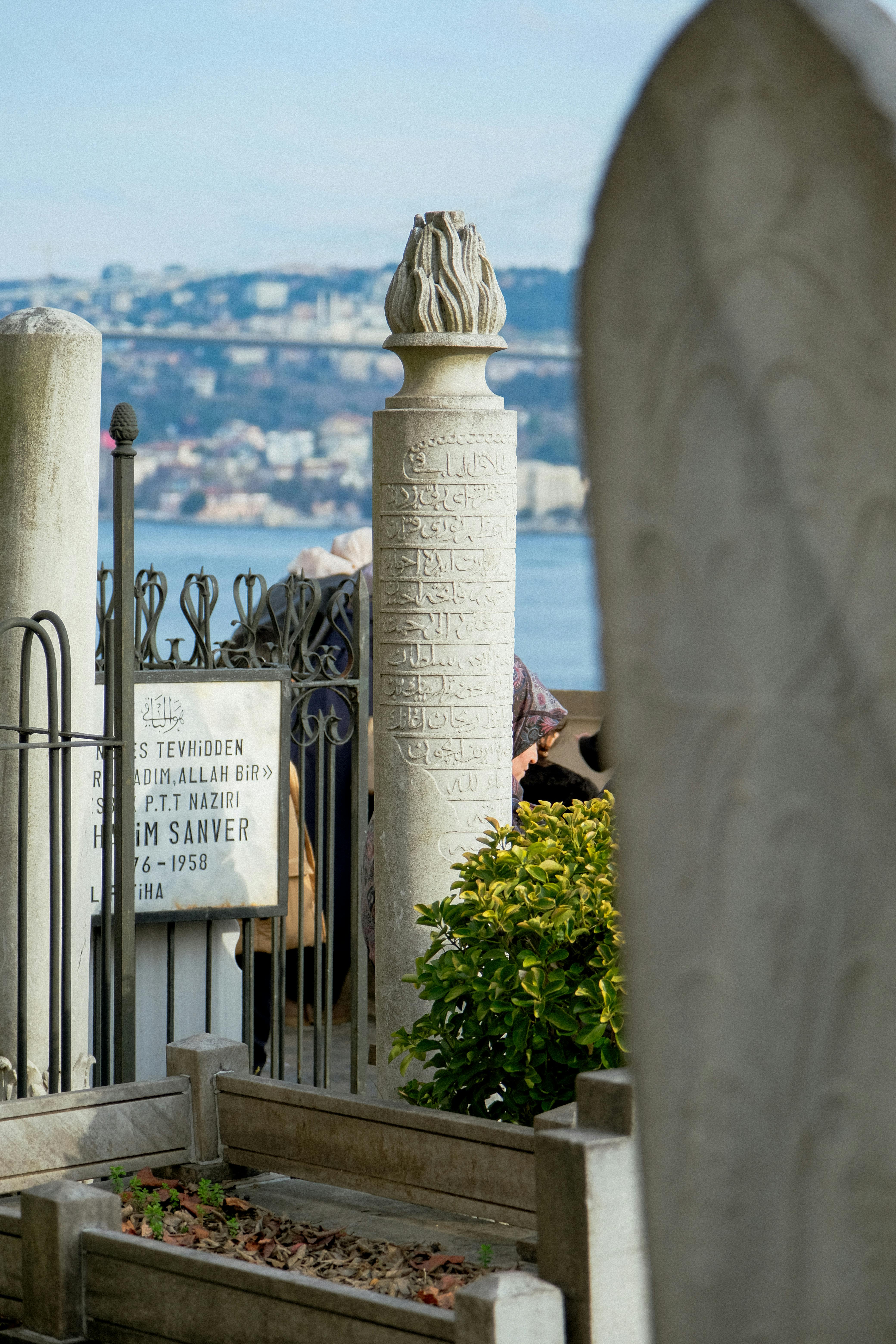 Scenic Cemetery View with Historical Tombstones · Free Stock Photo