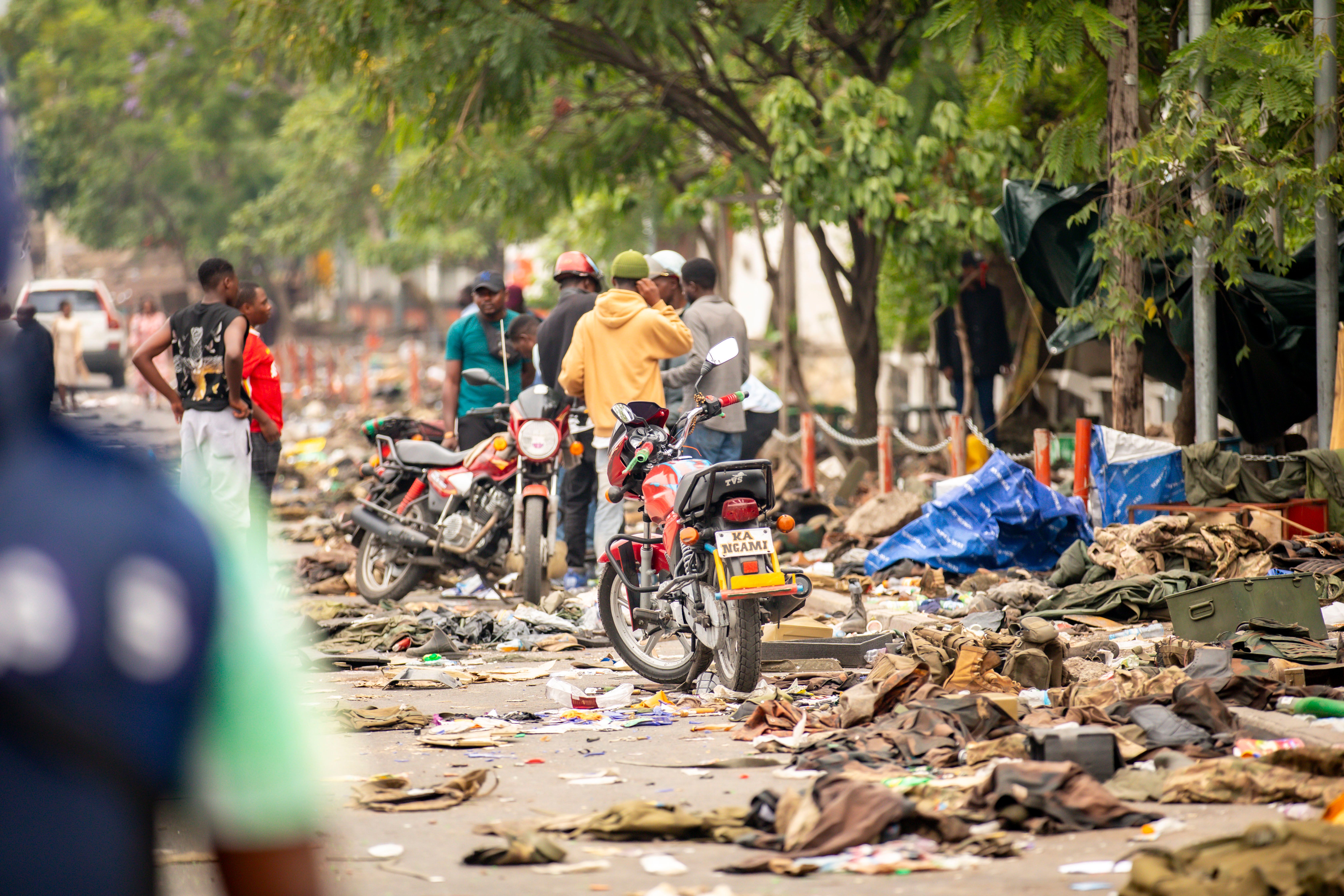 Urban Street Scene with Motorcycles and Debris · Free Stock Photo