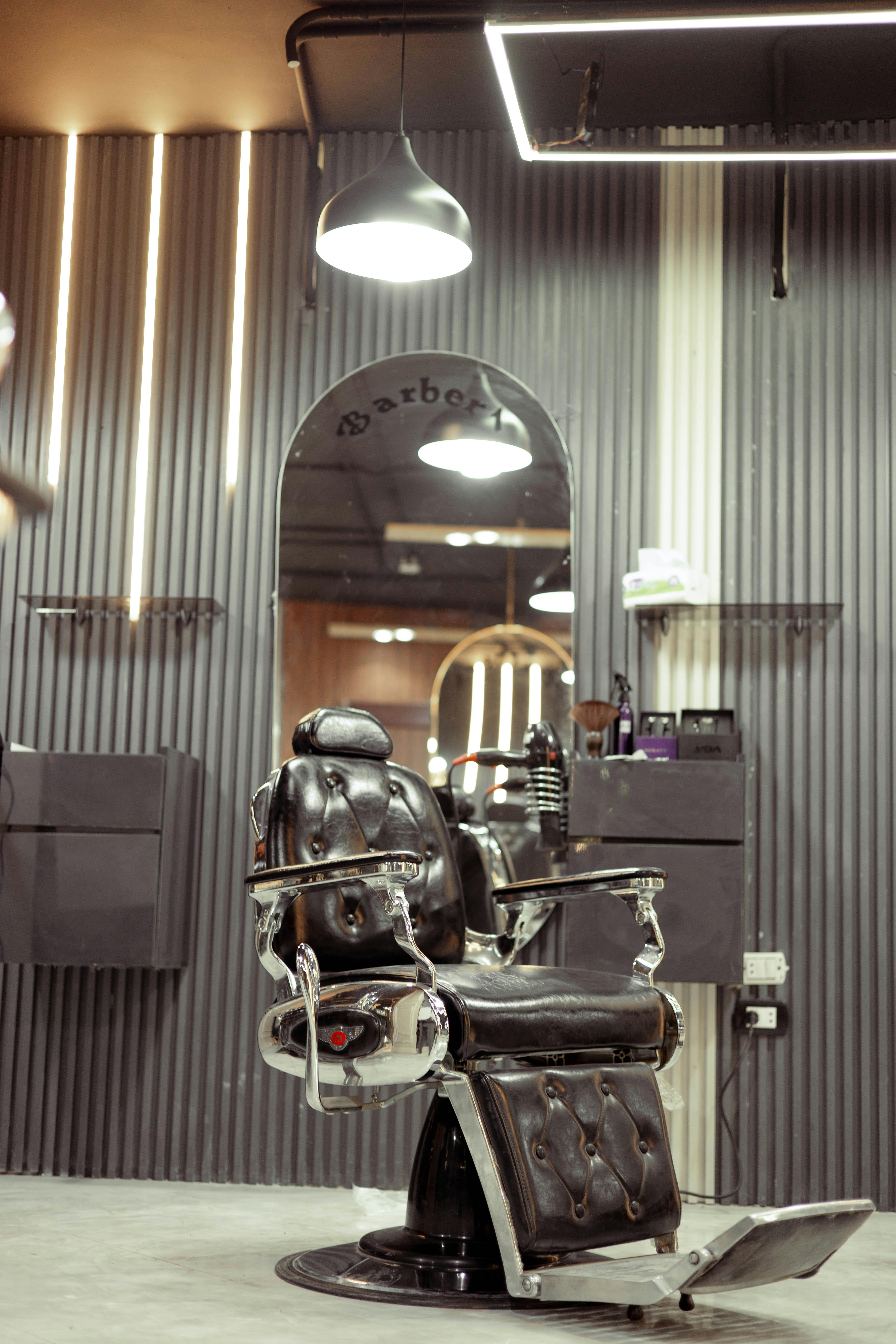 Modern hairdressing salon interior design with leather chairs · Free ...