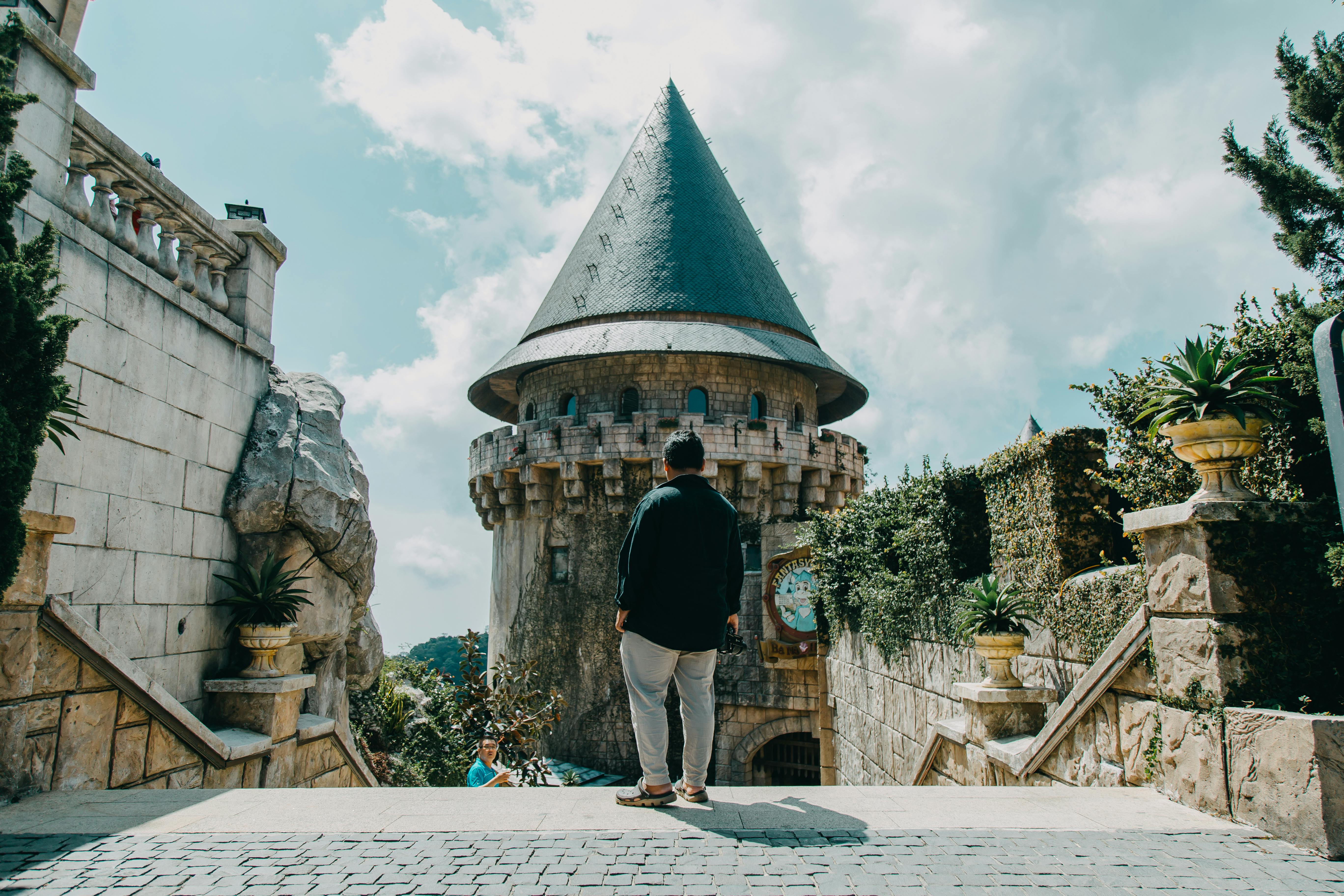 Man Staring at Castle · Free Stock Photo