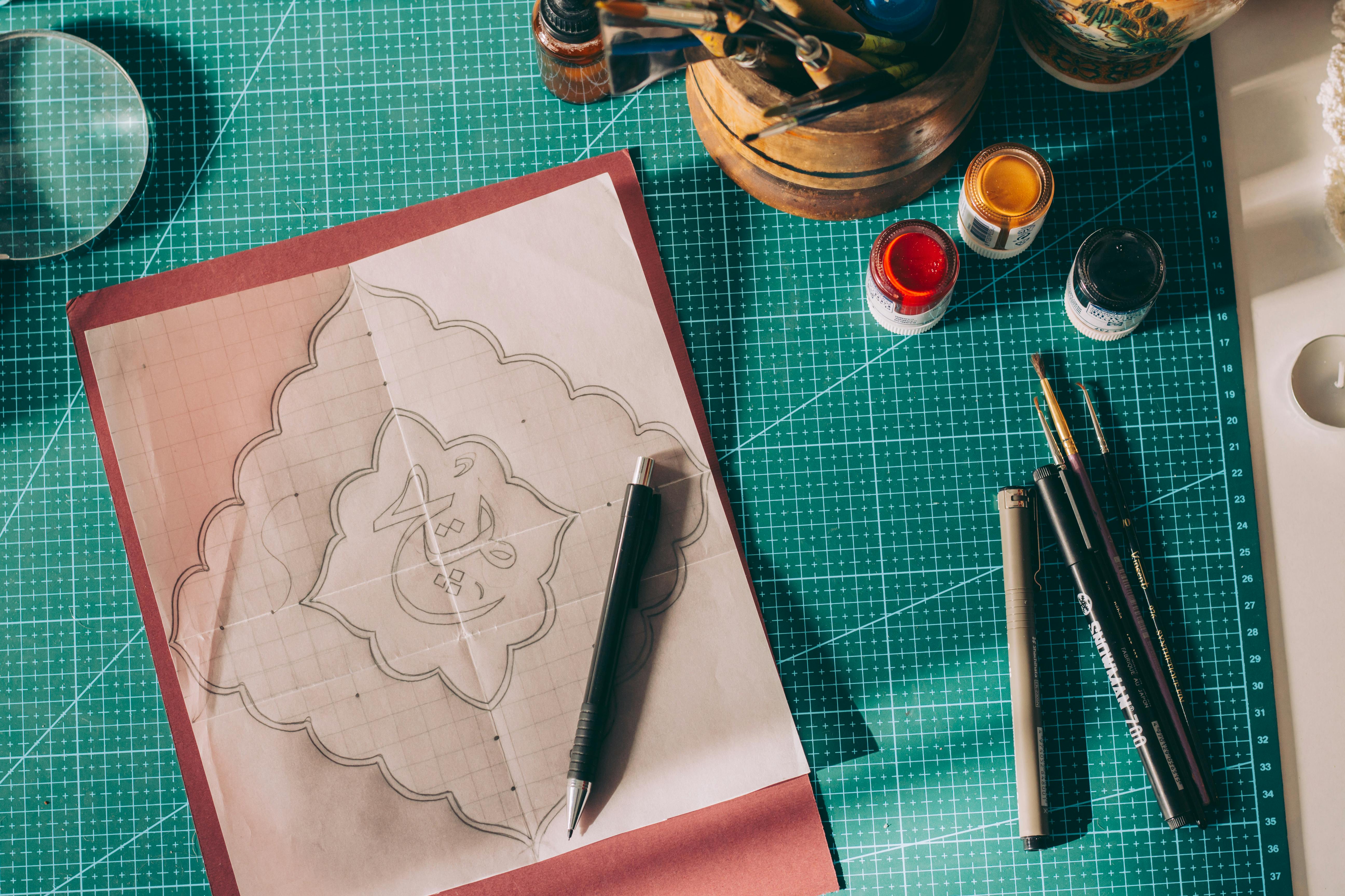 Artistic workspace with calligraphy supplies · Free Stock Photo