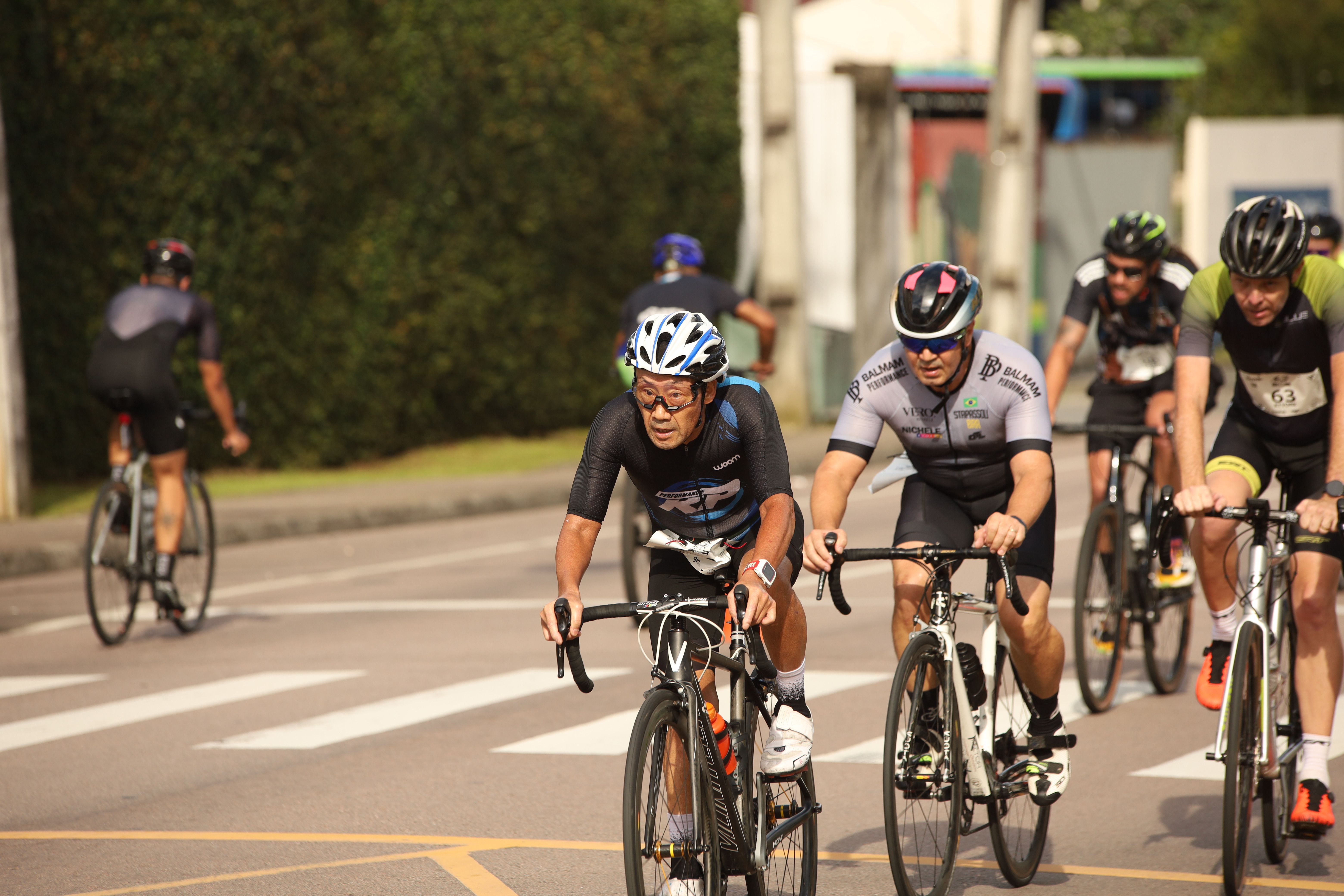 Cyclists Racing in Outdoor Competition · Free Stock Photo