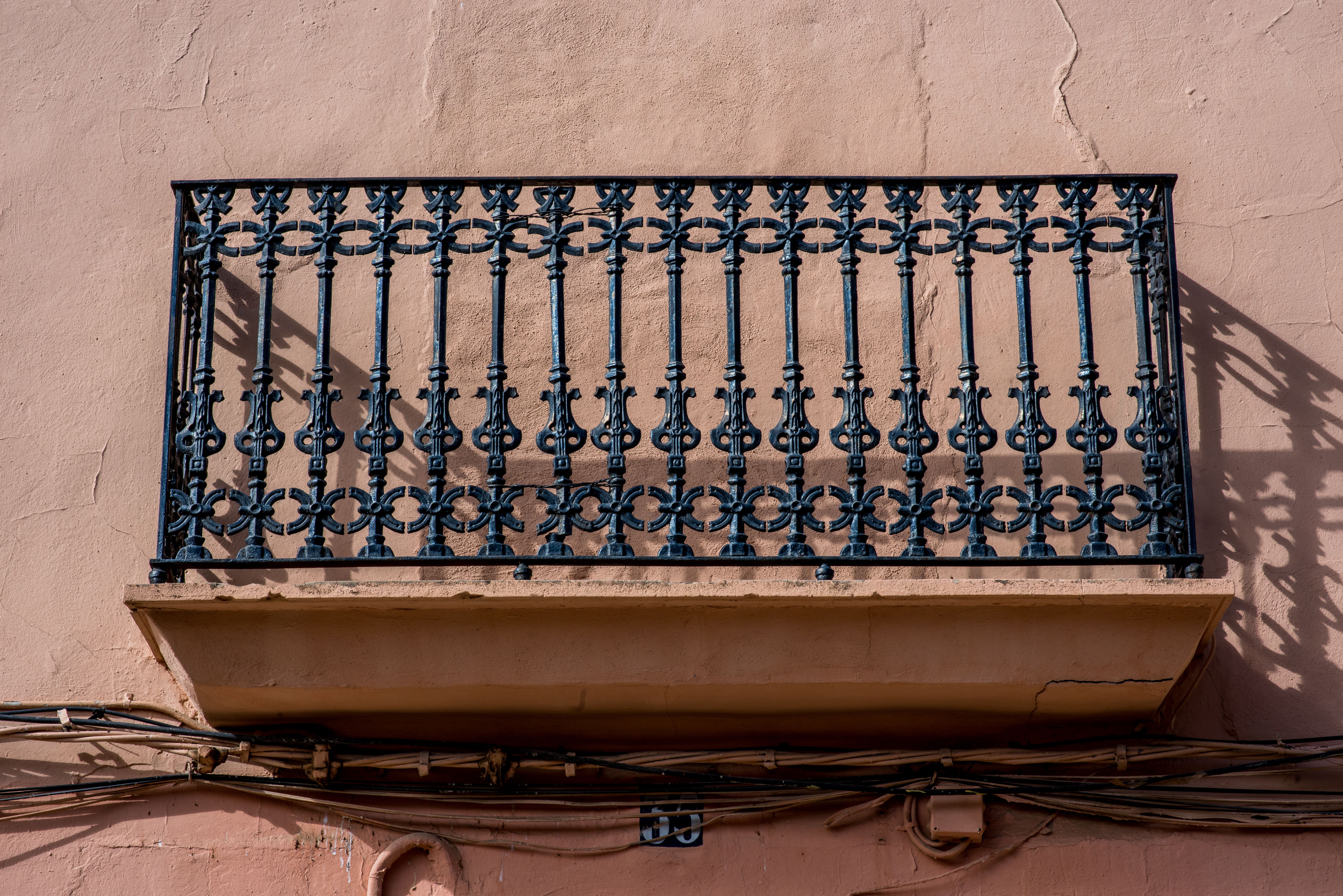 Decorative Iron Balcony on Rustic Wall · Free Stock Photo