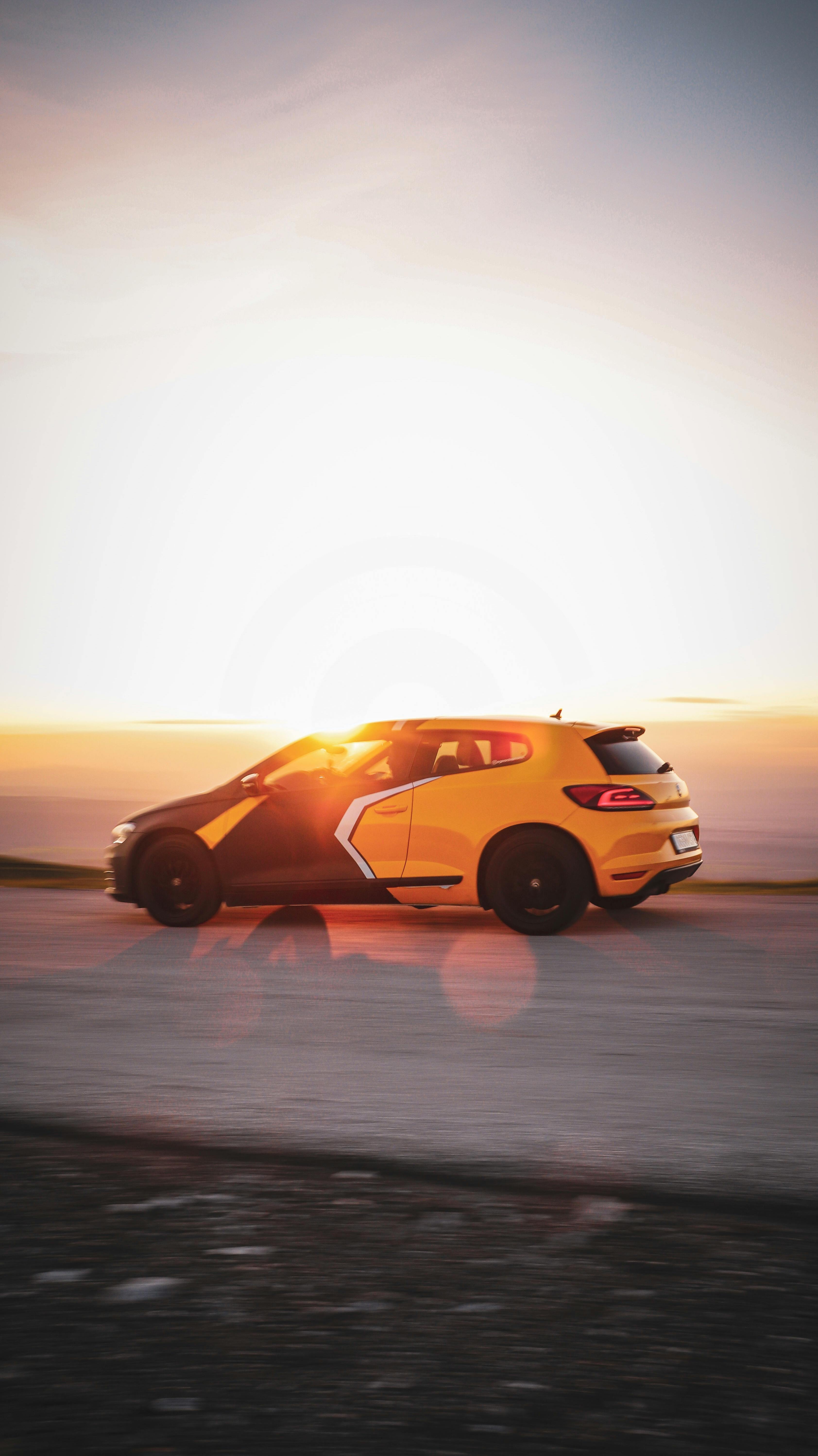 Dynamic Yellow Car at Sunset in Ankara · Free Stock Photo