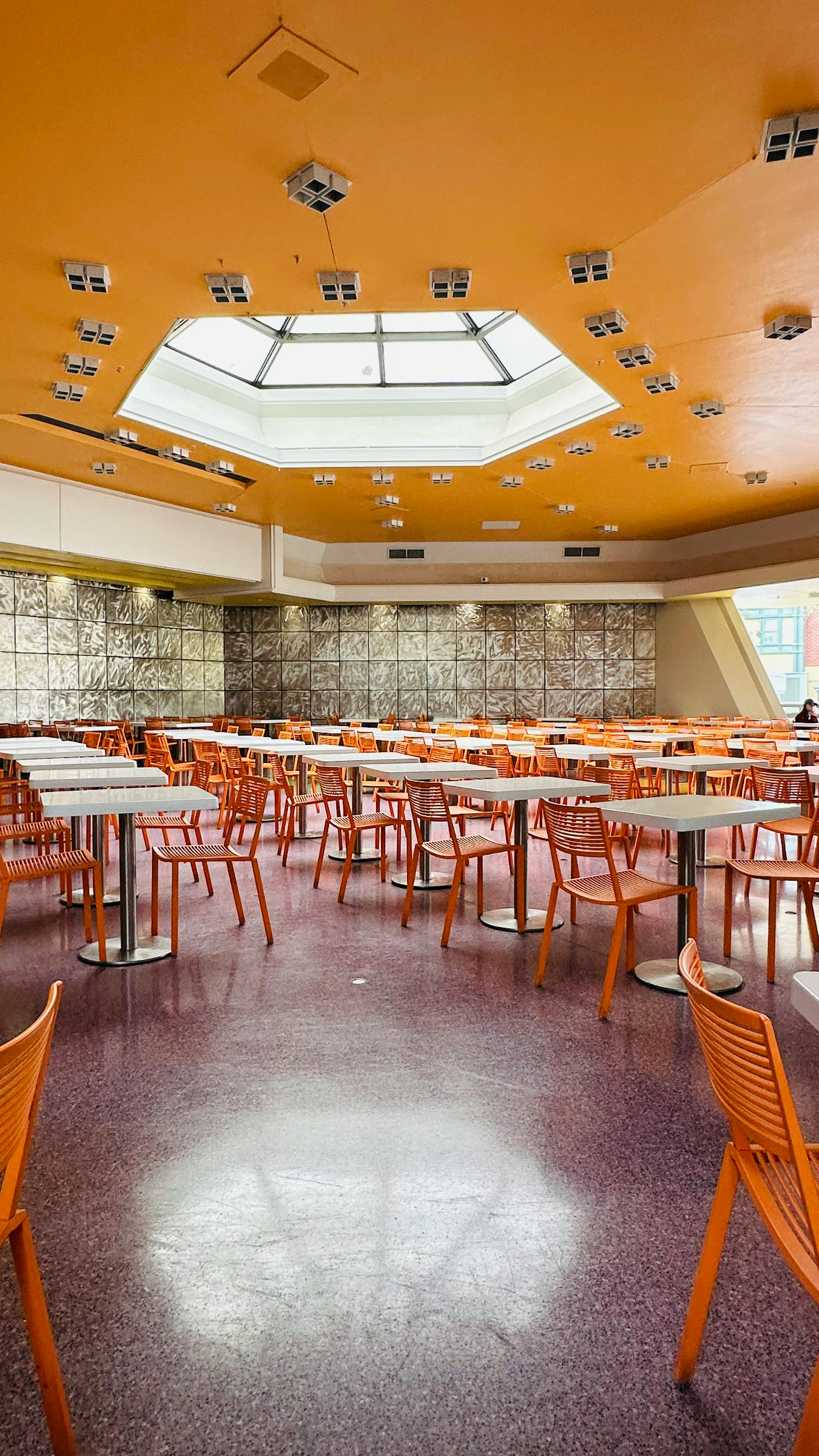 Modern Empty Cafeteria with Orange Chairs · Free Stock Photo