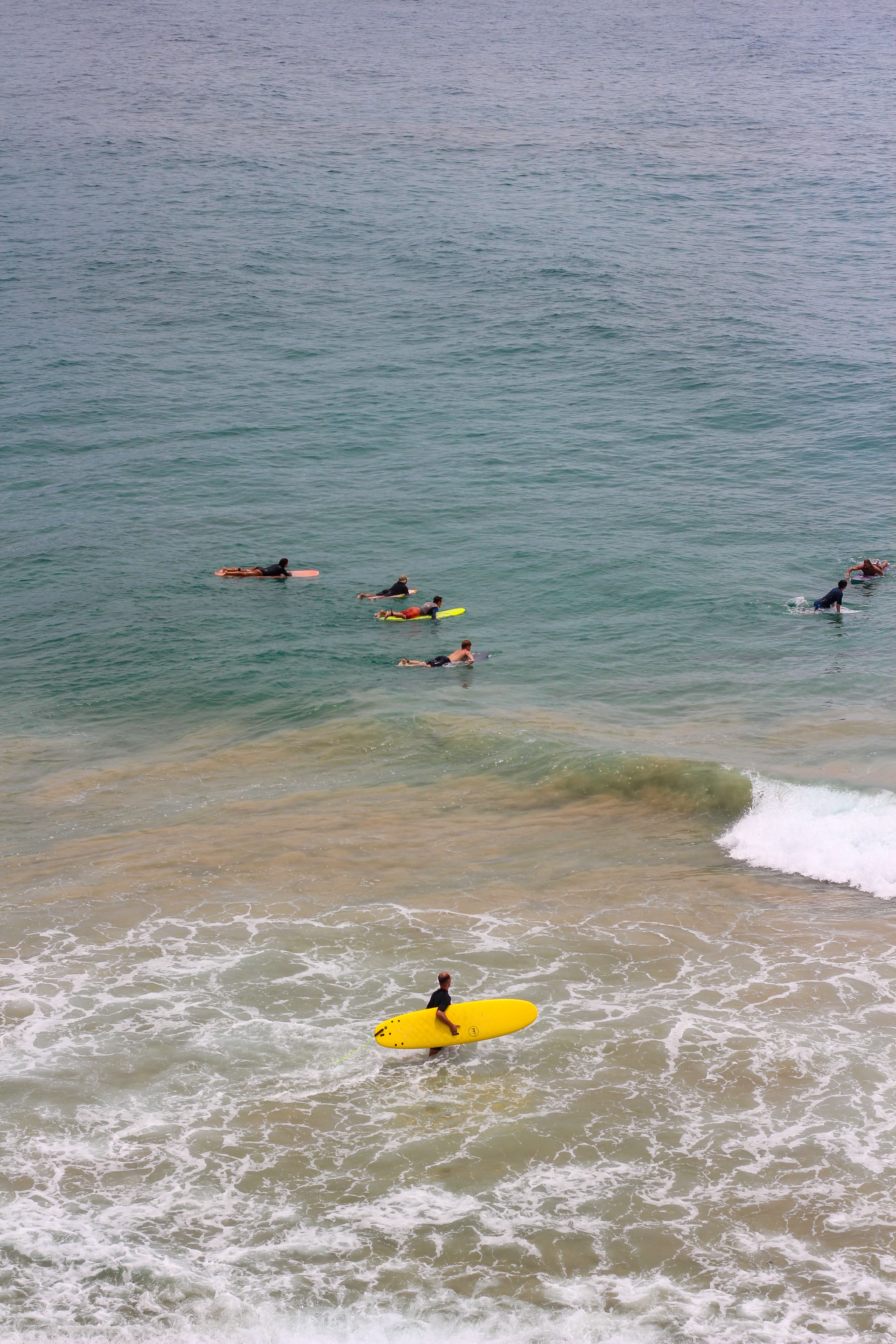 Aerial View of Surfers Enjoying Byron Bay Waves · Free Stock Photo