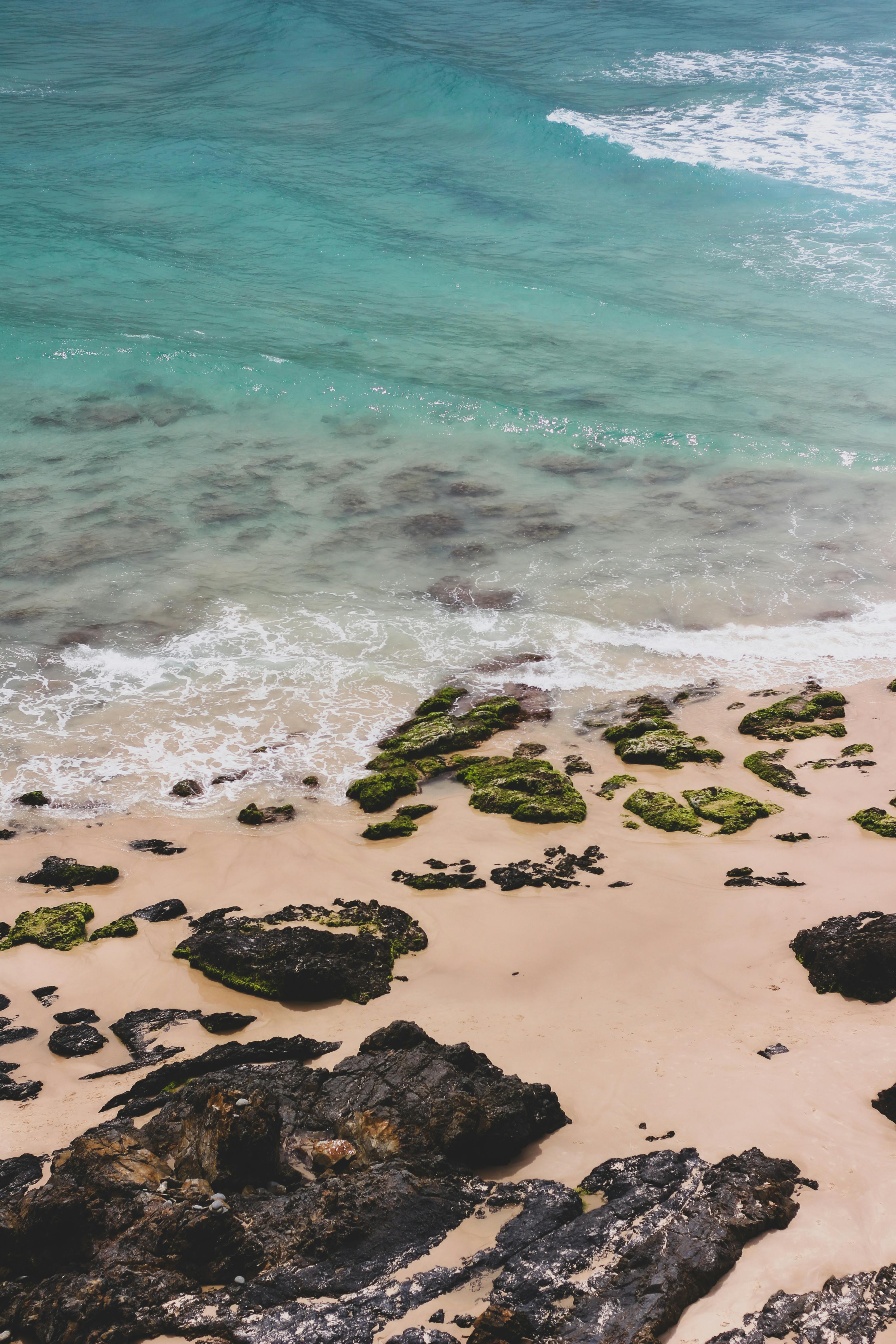 Aerial View of Byron Bay Beach with Rocks · Free Stock Photo