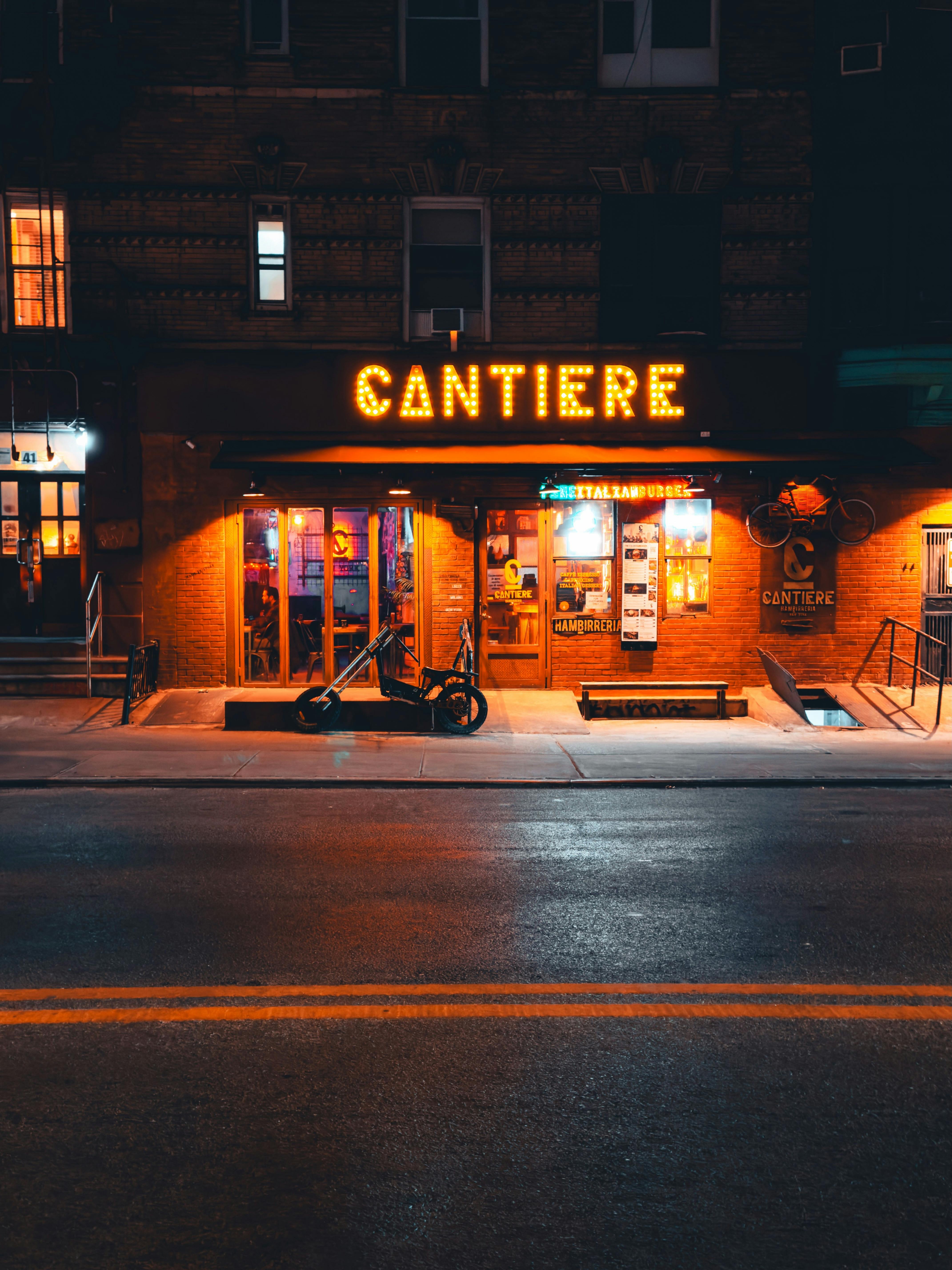 Vintage Italian Restaurant Facade at Night · Free Stock Photo