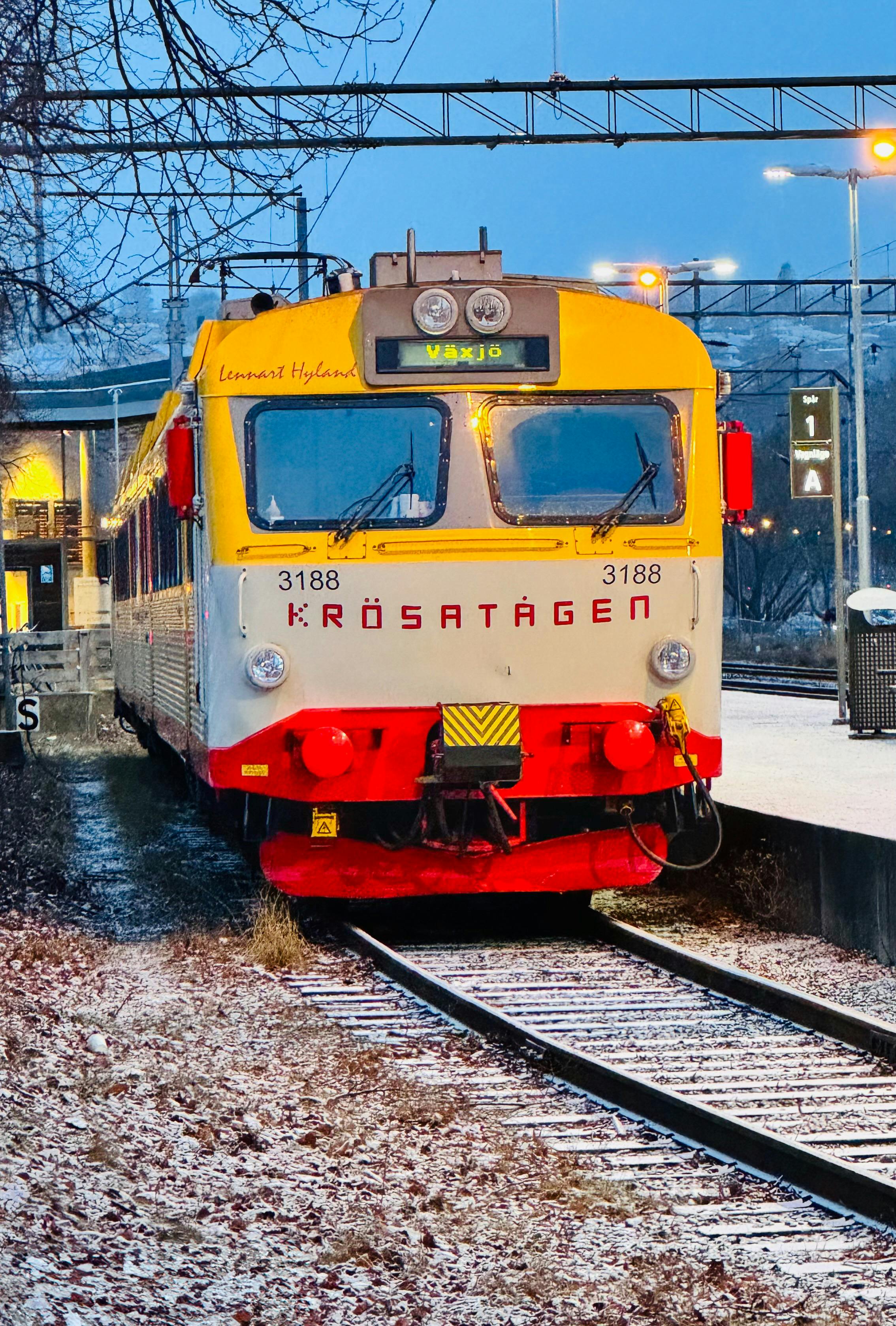 Colorful Swedish Train at Winter Station · Free Stock Photo