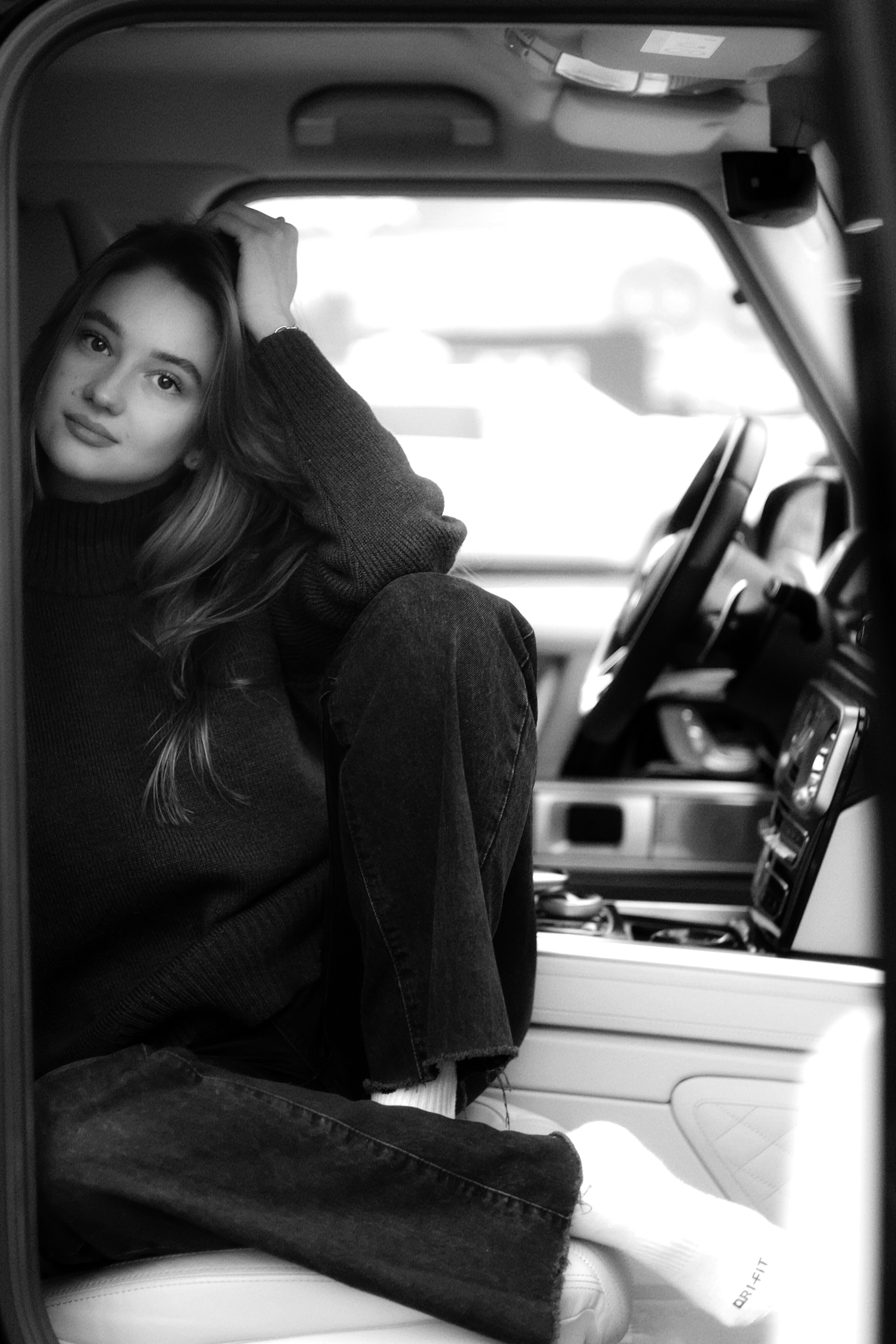 Thoughtful Woman Relaxing in Car Interior · Free Stock Photo