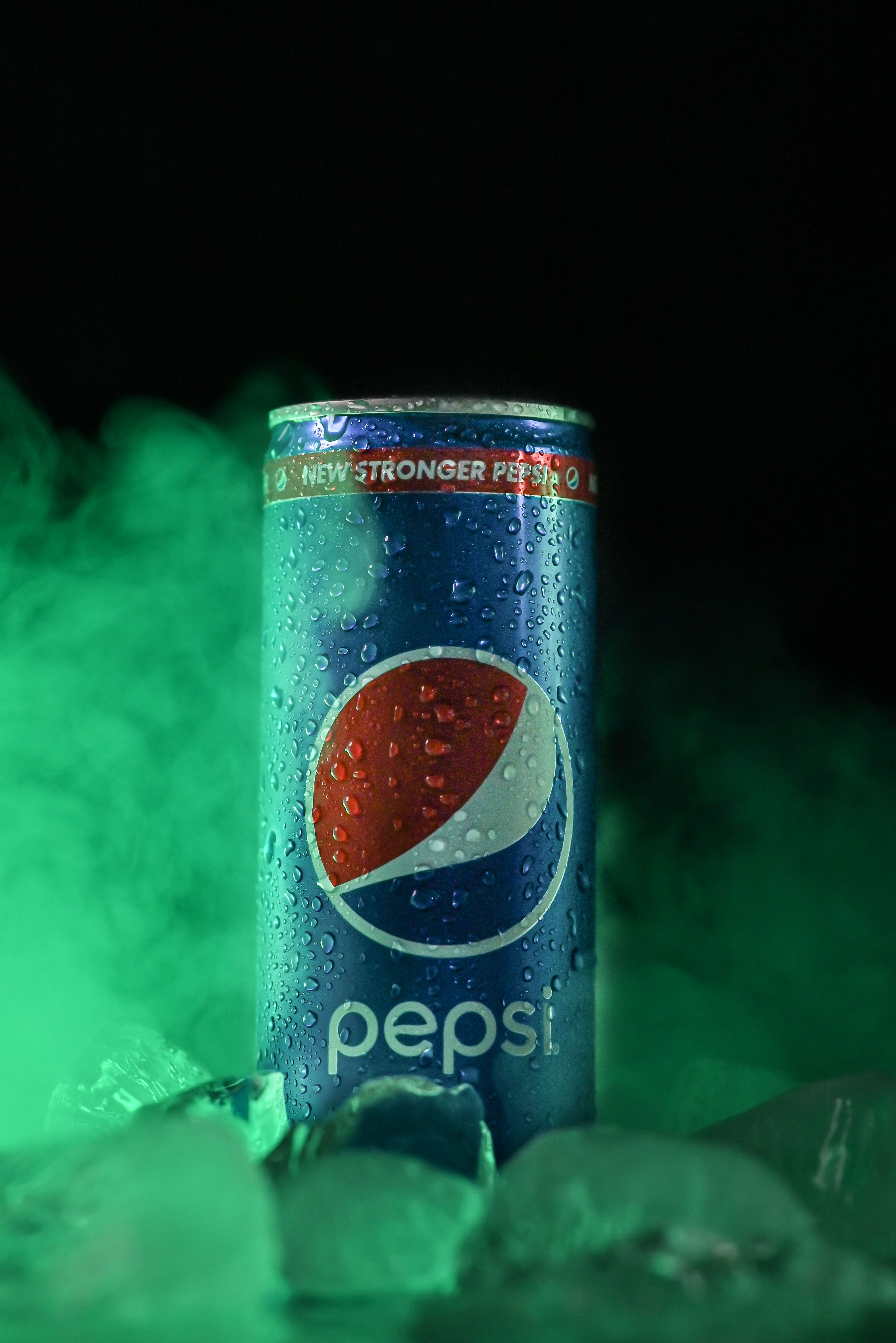 Pepsi Can Surrounded by Ice with Green Mist · Free Stock Photo