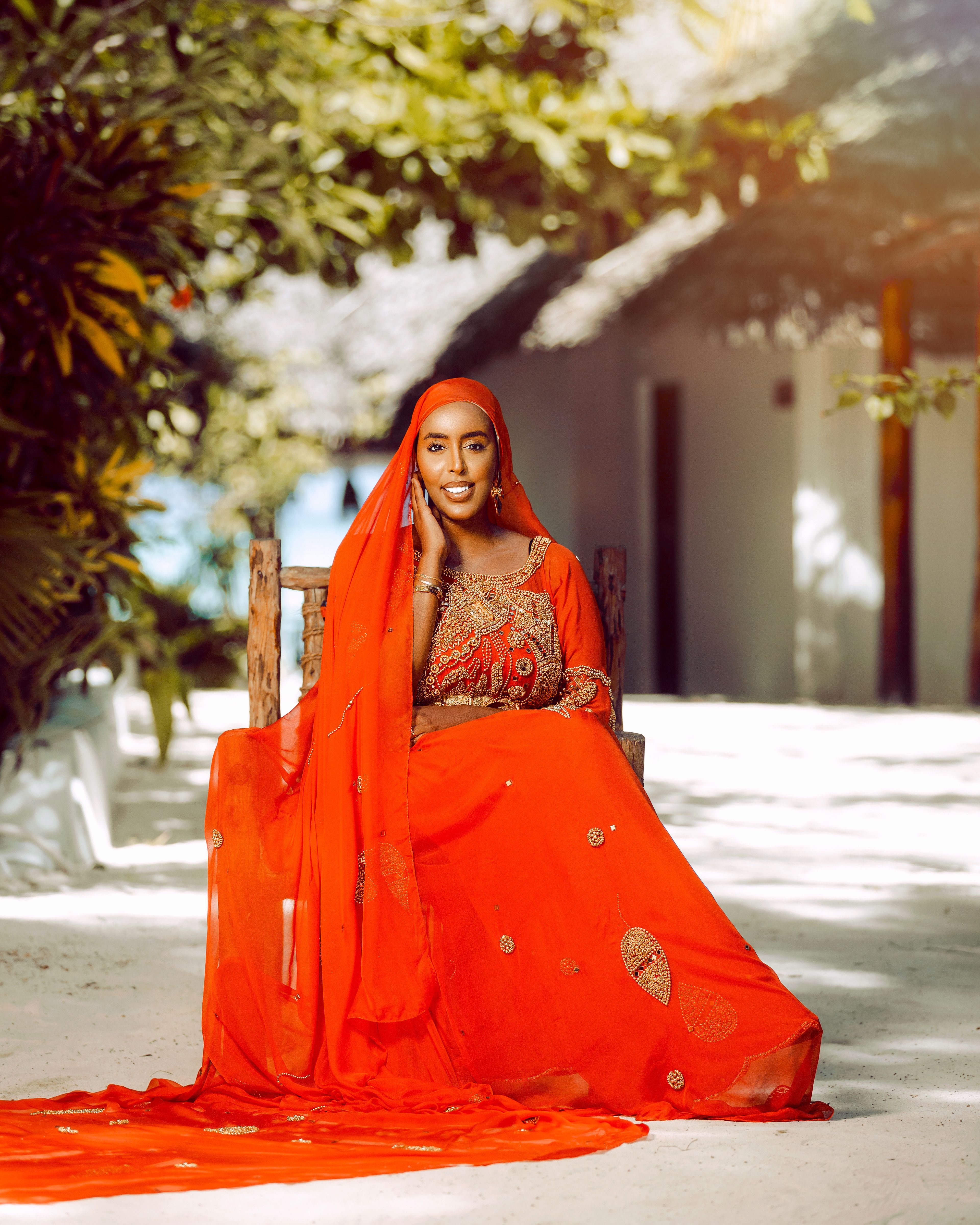 Elegant Woman in Traditional Red Dress Outdoors · Free Stock Photo