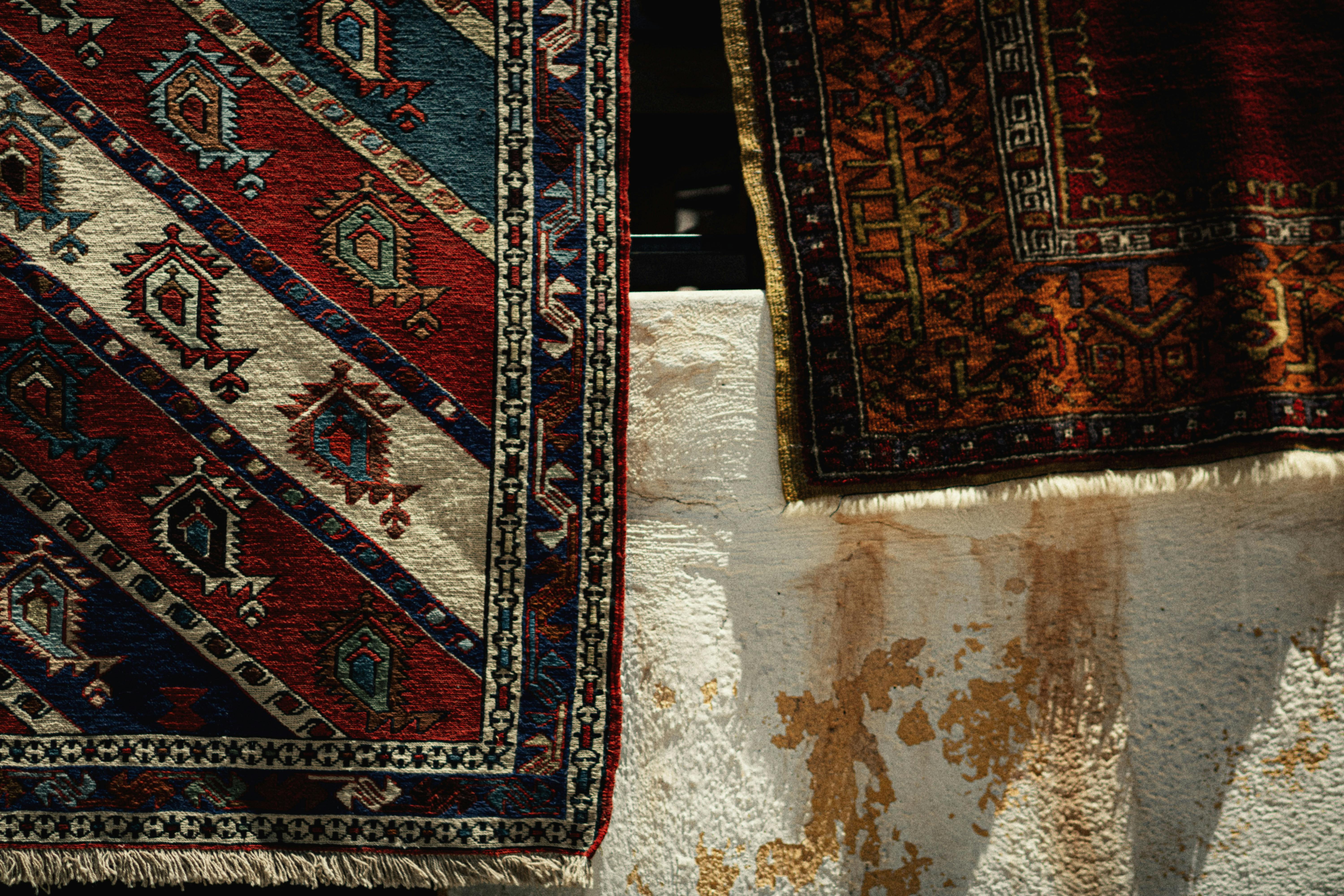 Traditional Patterned Rugs Hanging Outdoors · Free Stock Photo