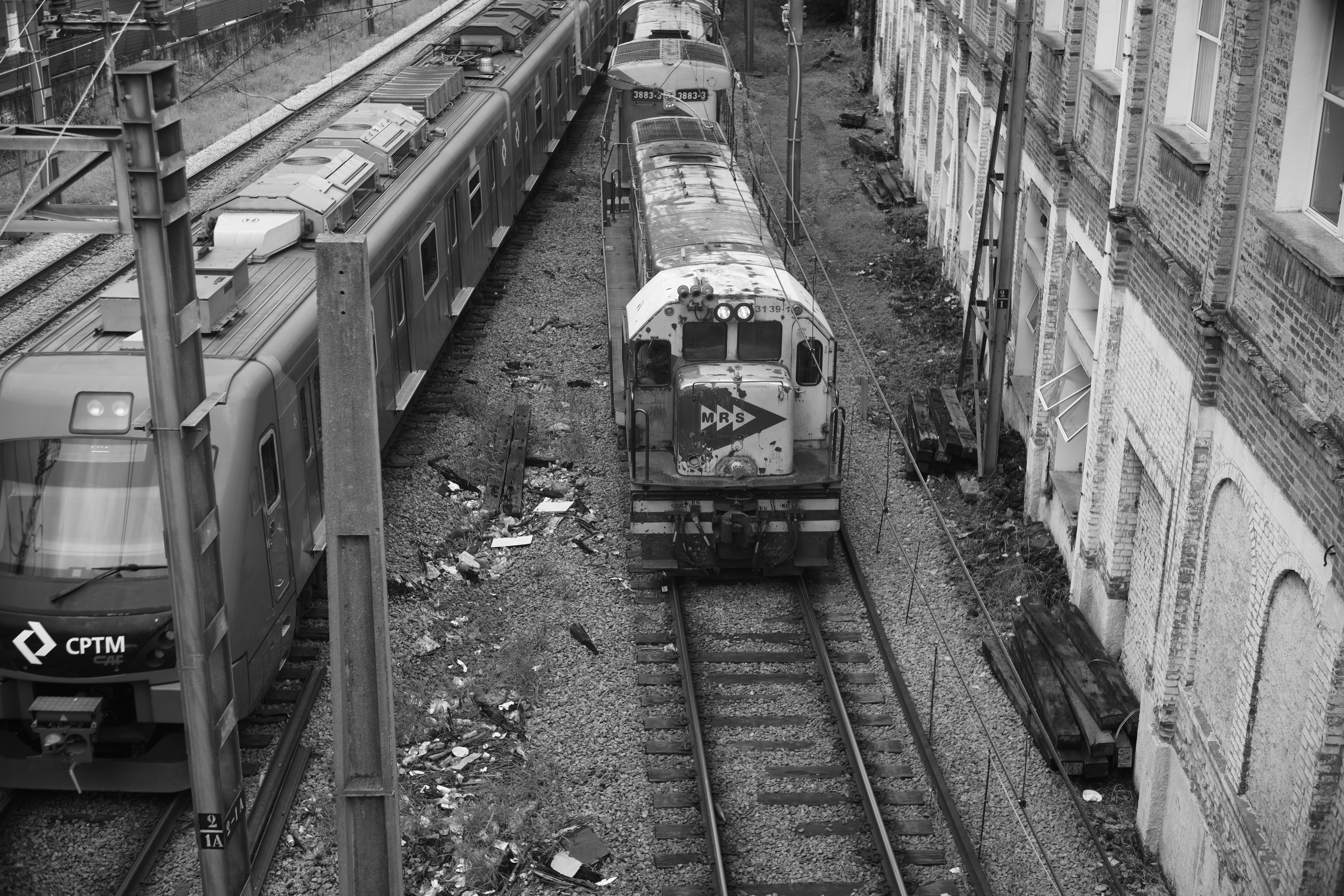 Monochrome Urban Train Scene with Railroads · Free Stock Photo