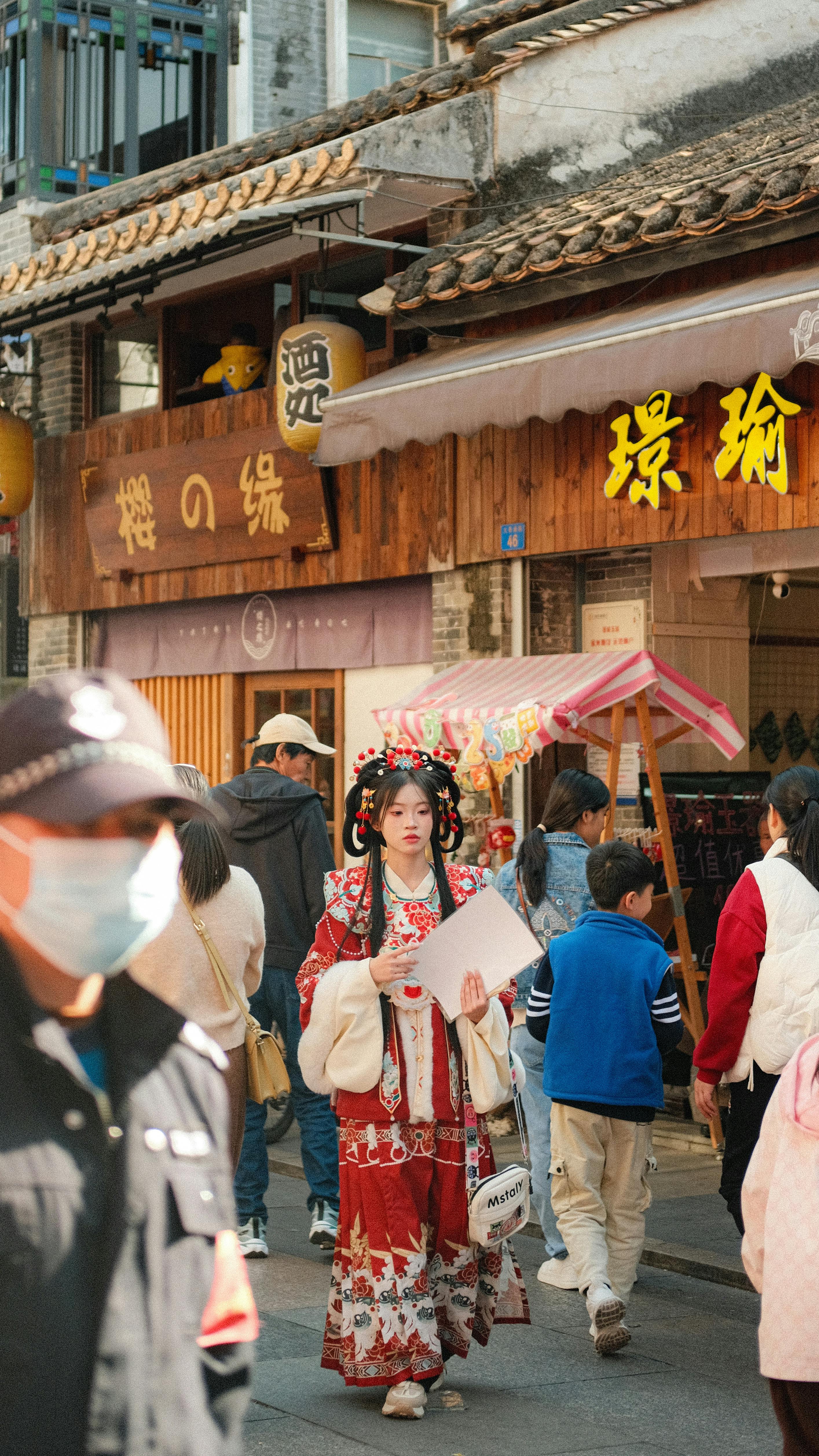 Traditional Chinese Street Scene with People · Free Stock Photo