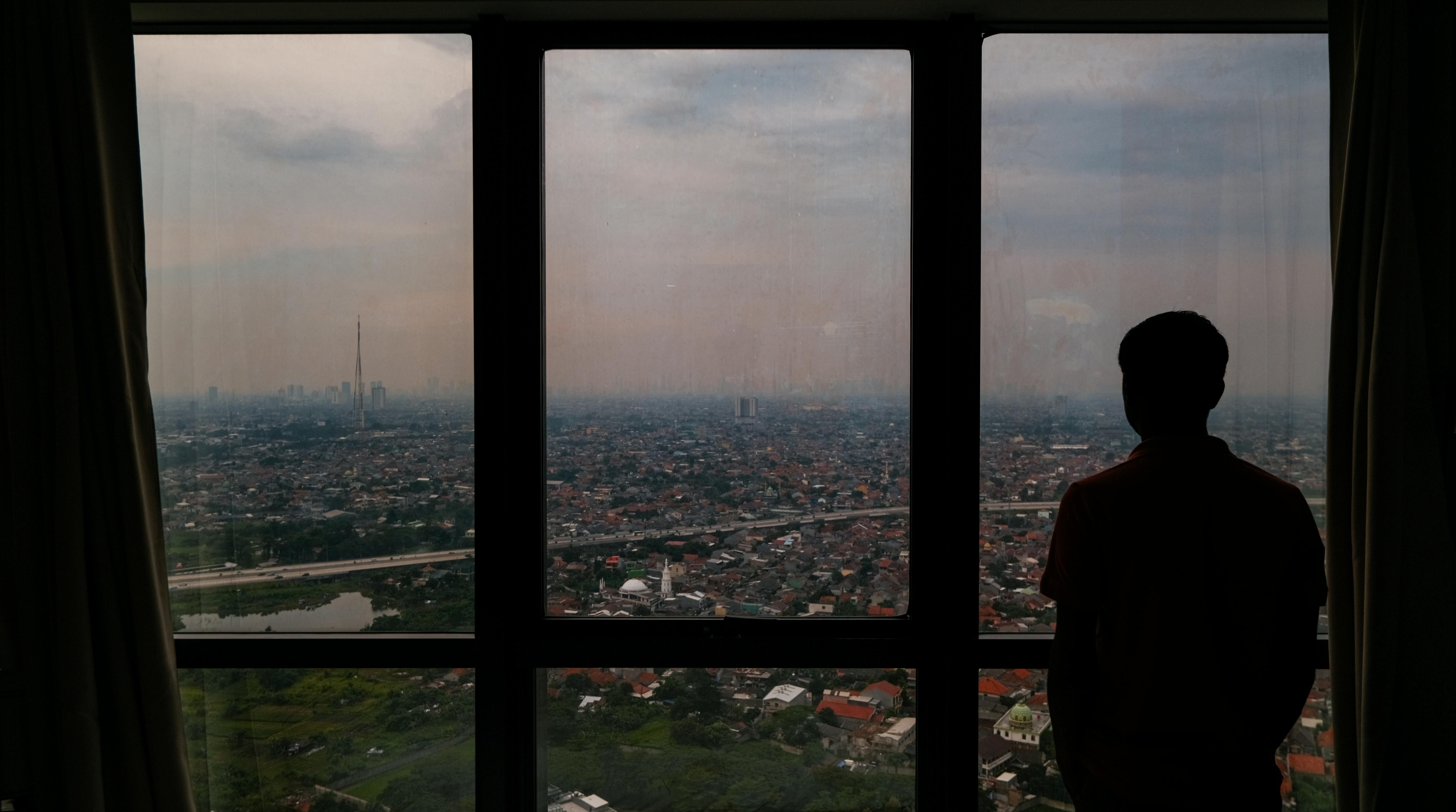 Silhouette City View from High Rise Window · Free Stock Photo