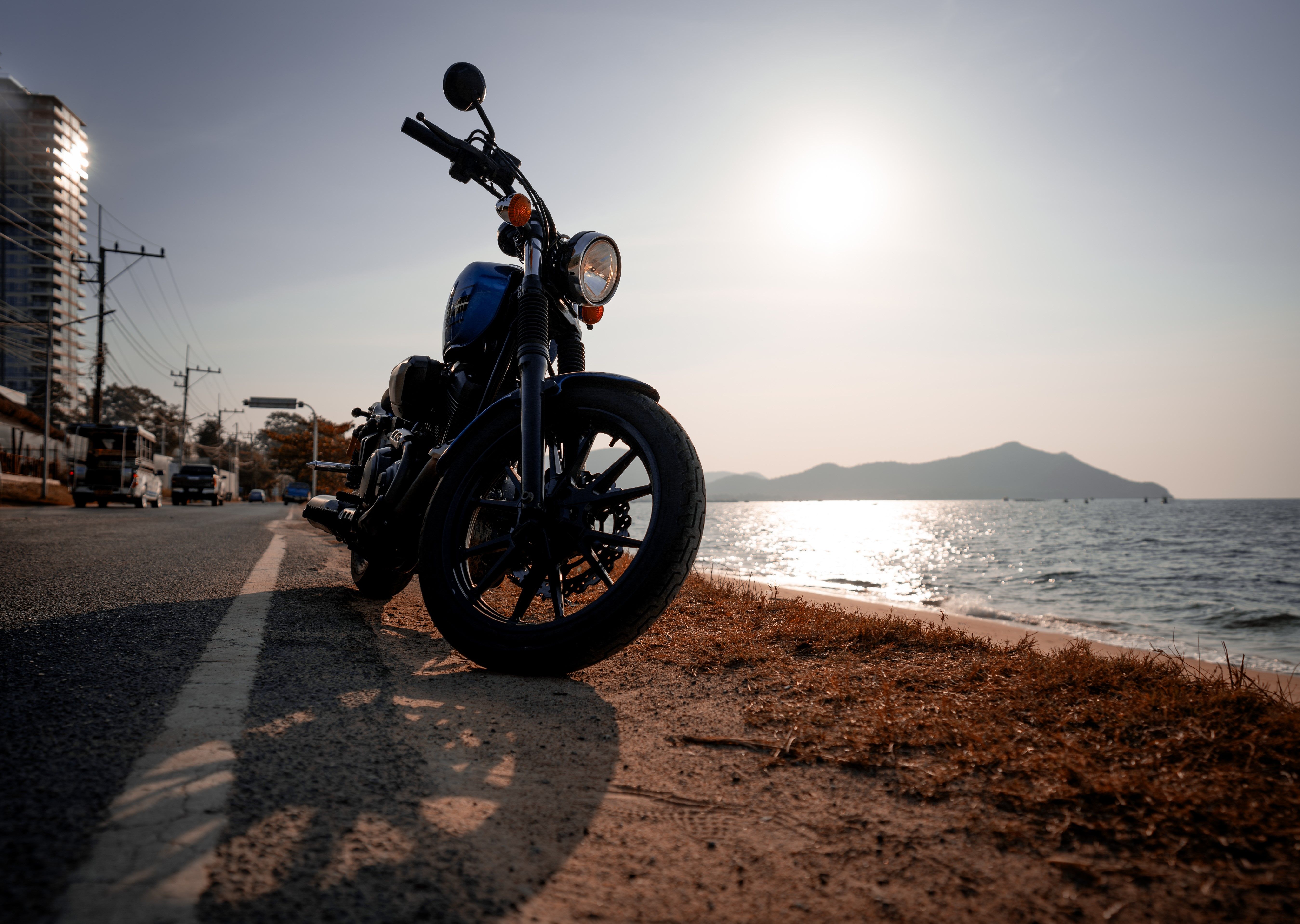 Motorcycle by the Seaside at Sunset · Free Stock Photo