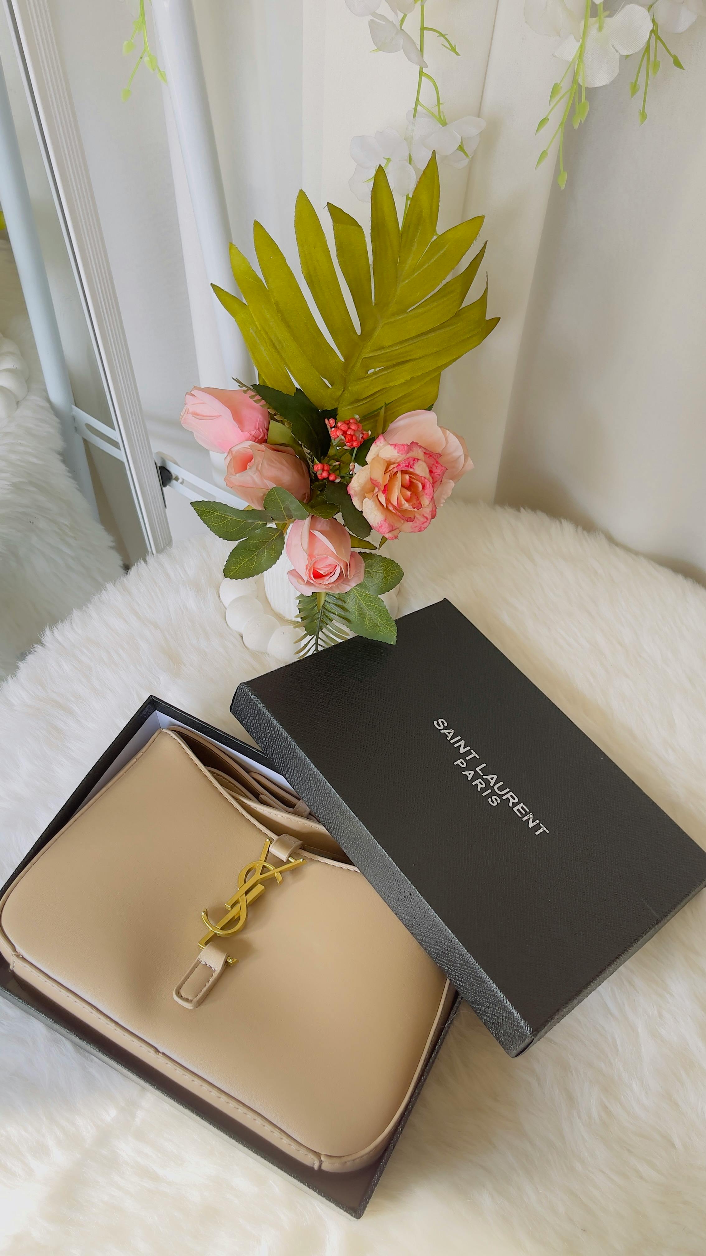 Hand with a Ring, Paper Cup, Handbag and Flowers in a Shopping Bag ...