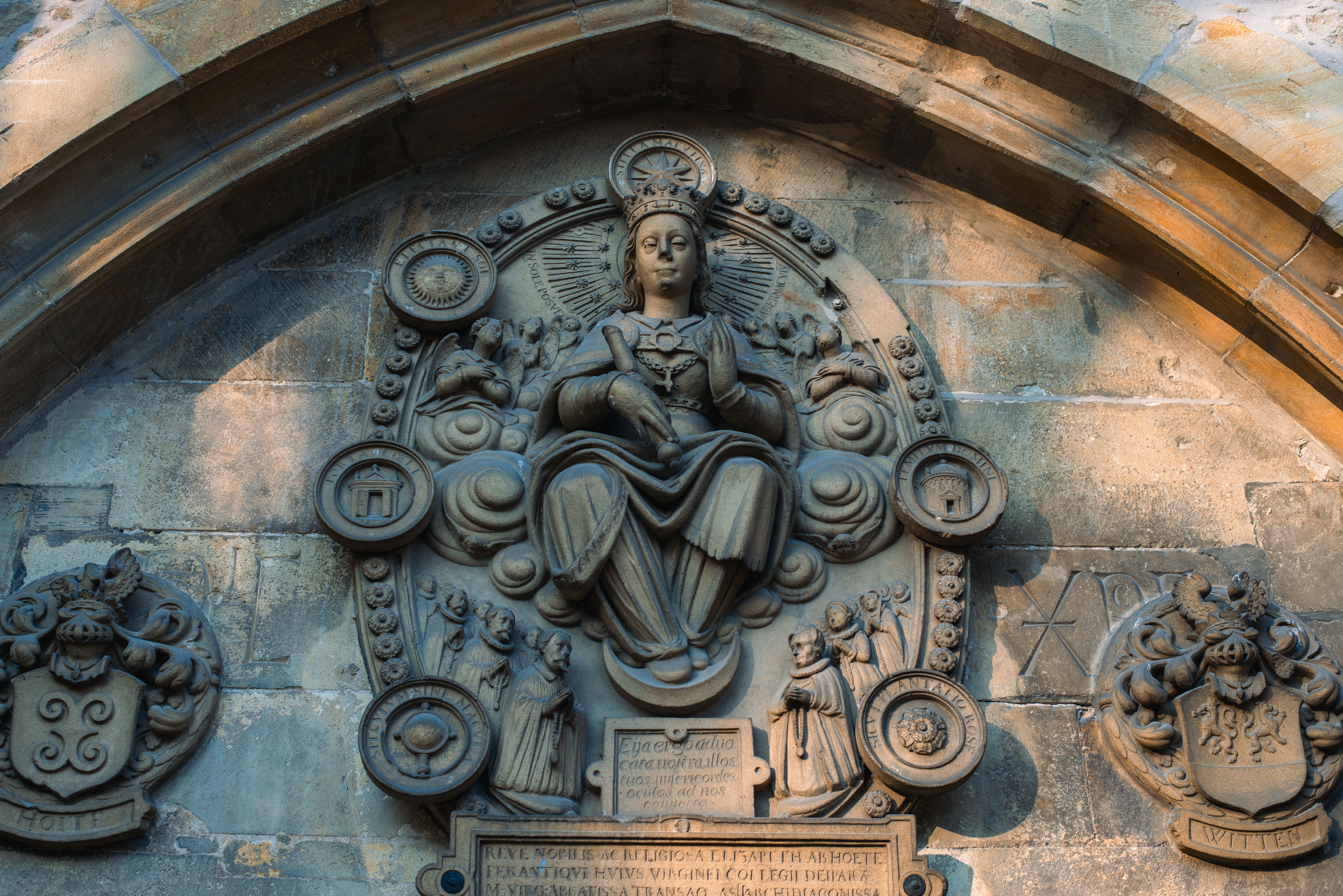 Historic Stone Sculpture on Church Facade · Free Stock Photo