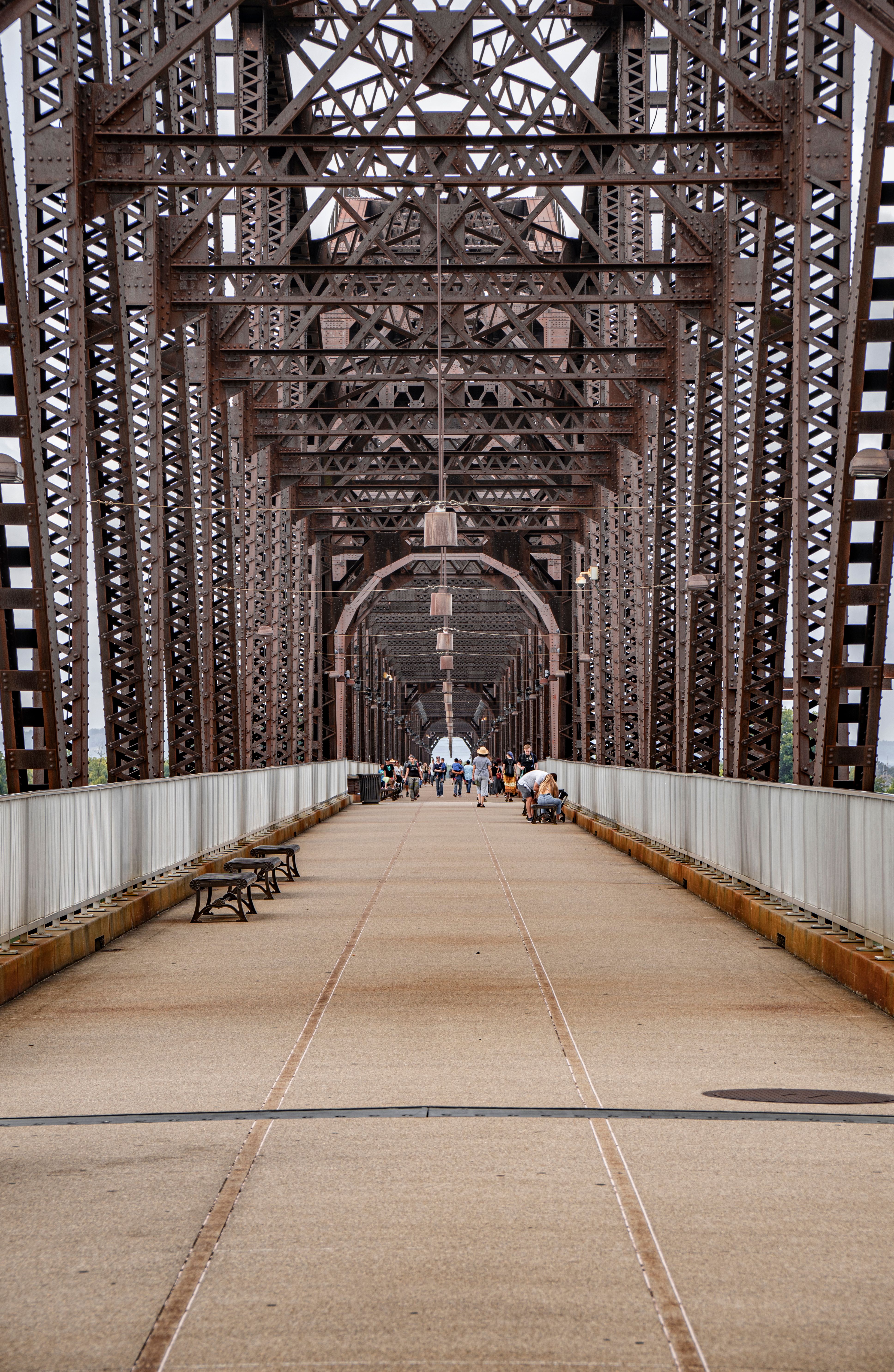 Iron Bridge with People Walking Across · Free Stock Photo