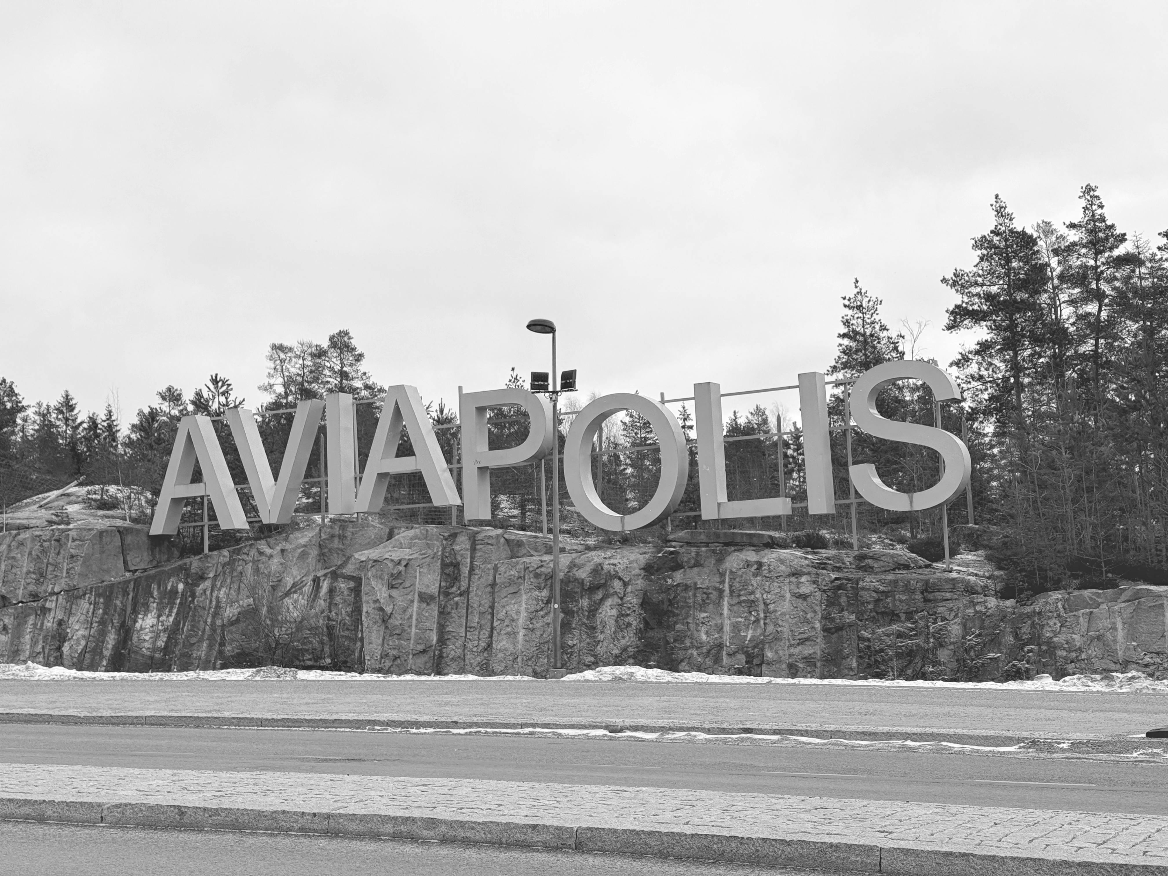 AviaPolis Landmark Sign in Natural Surroundings · Free Stock Photo