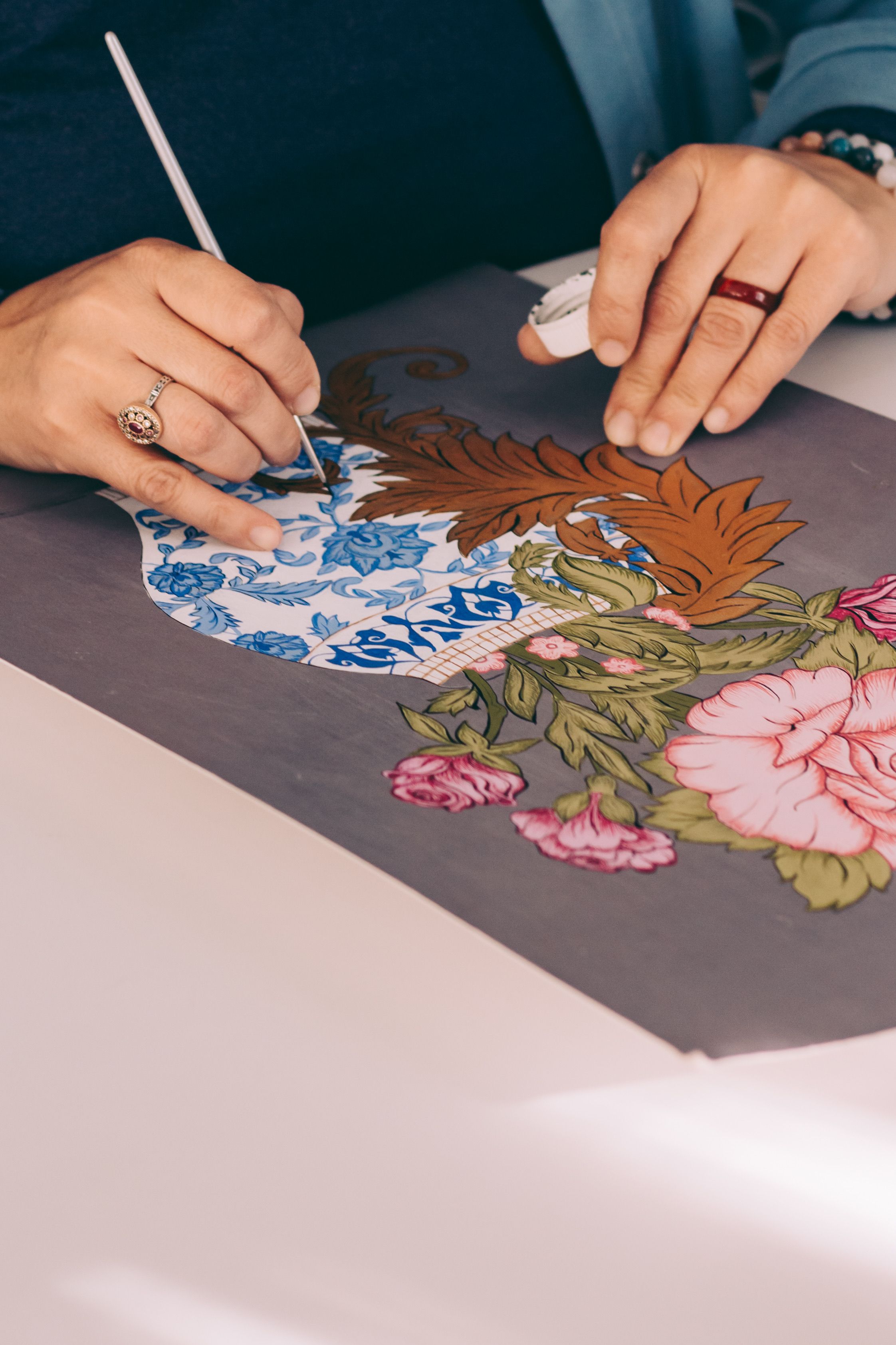 Artistic Hand Painting Floral Patterns on Canvas · Free Stock Photo