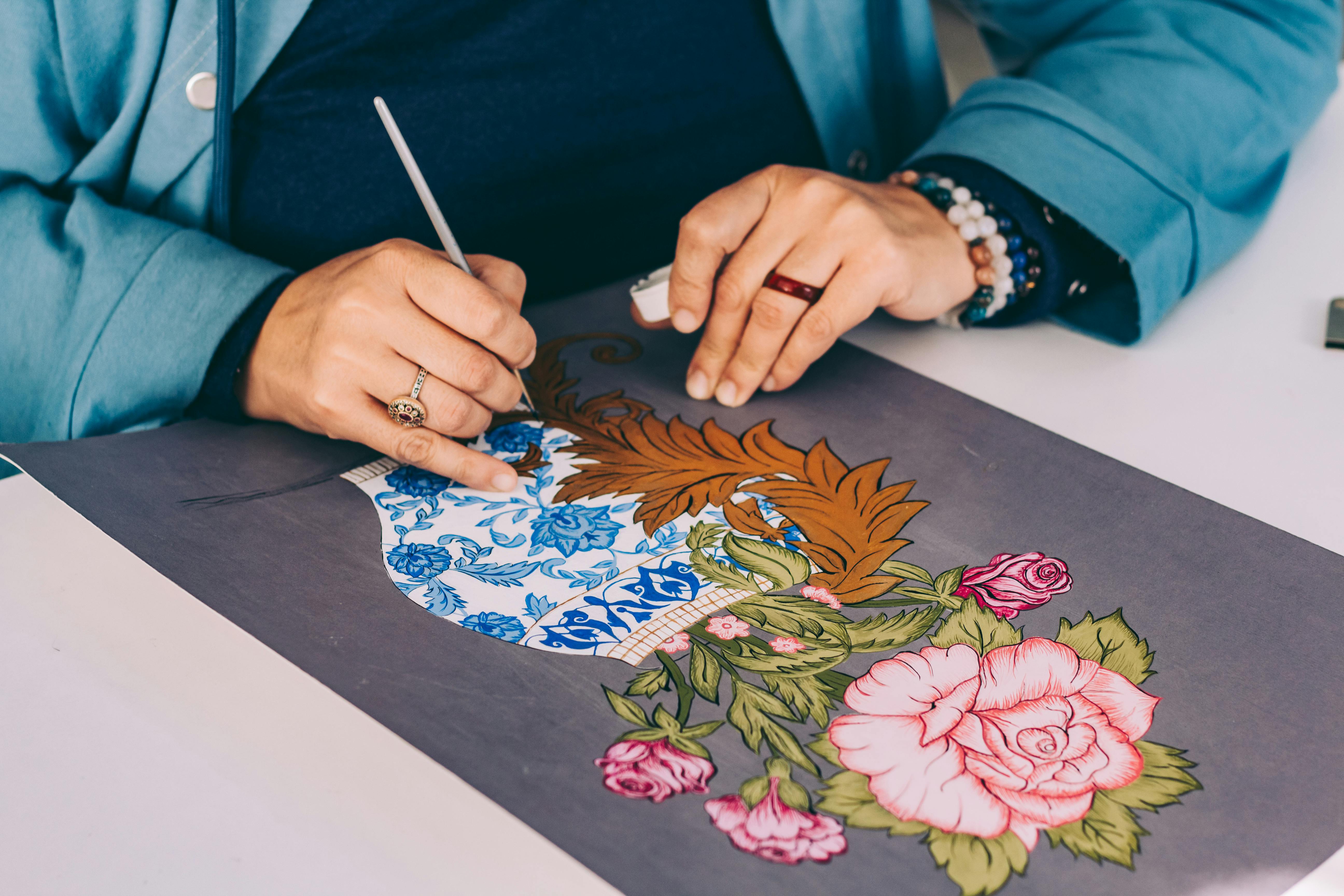 Handcrafting Floral Art on Canvas · Free Stock Photo