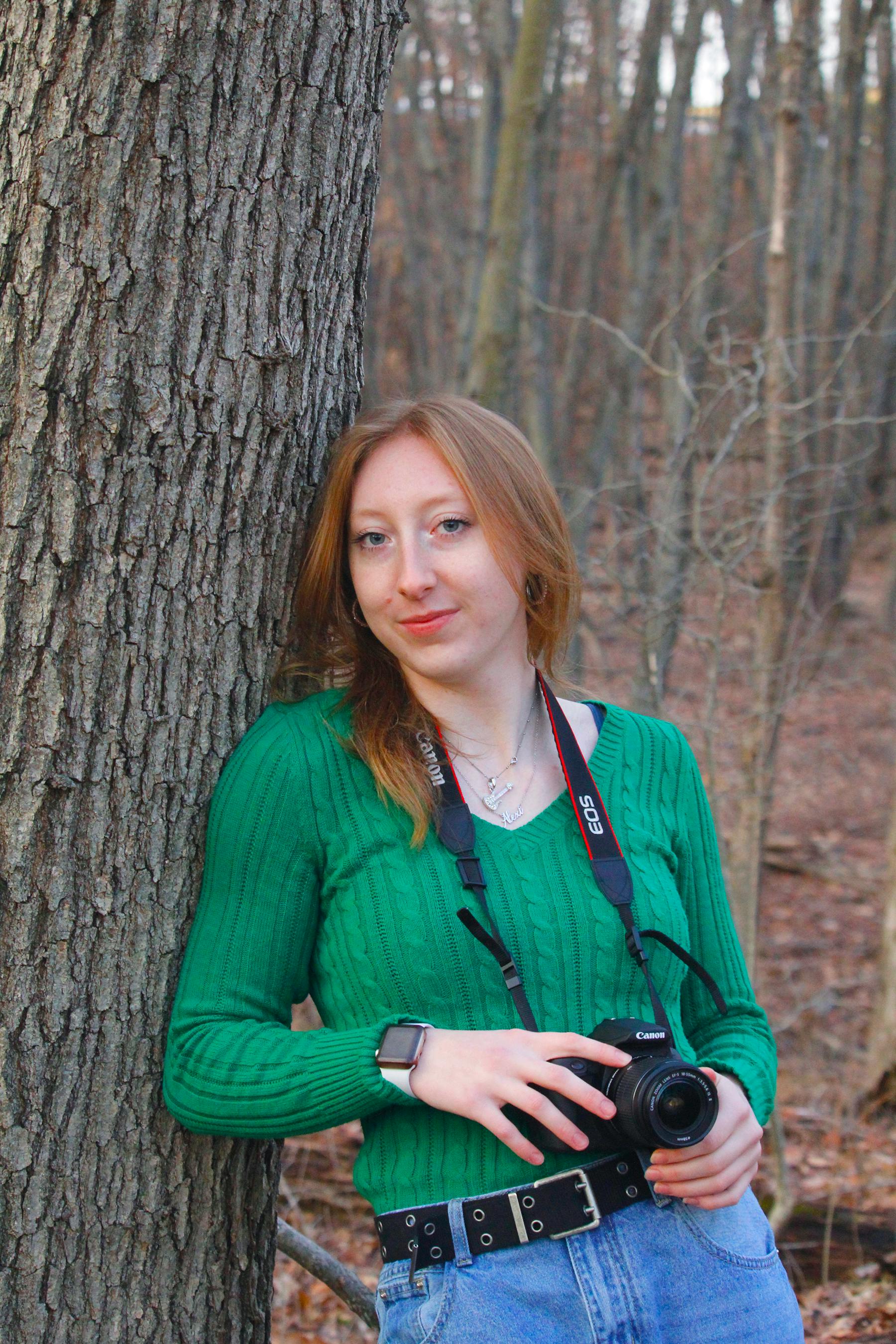 Portrait of Woman Photographer in Forest · Free Stock Photo