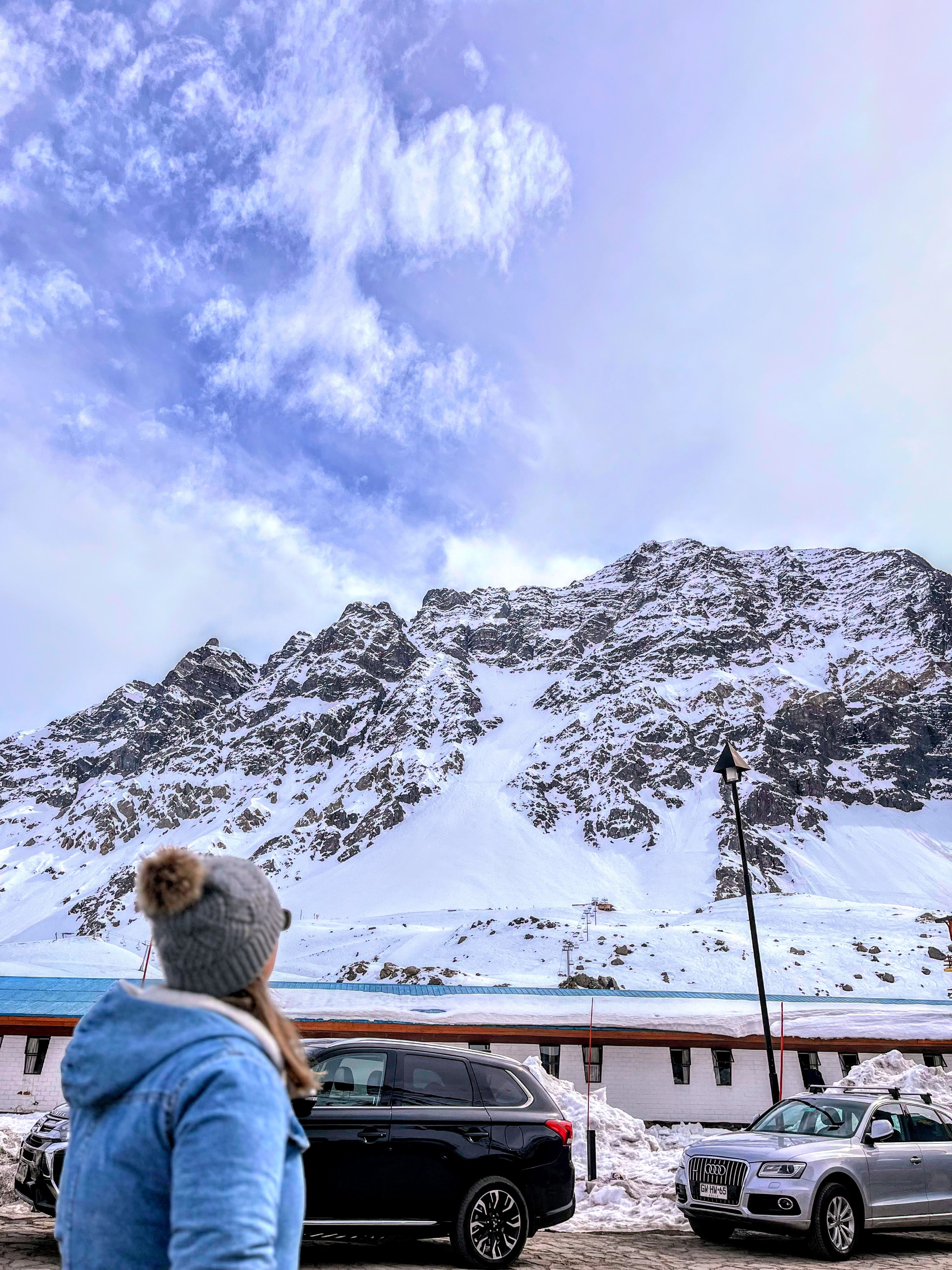 Snowy Mountain View with Tourist in Winter · Free Stock Photo