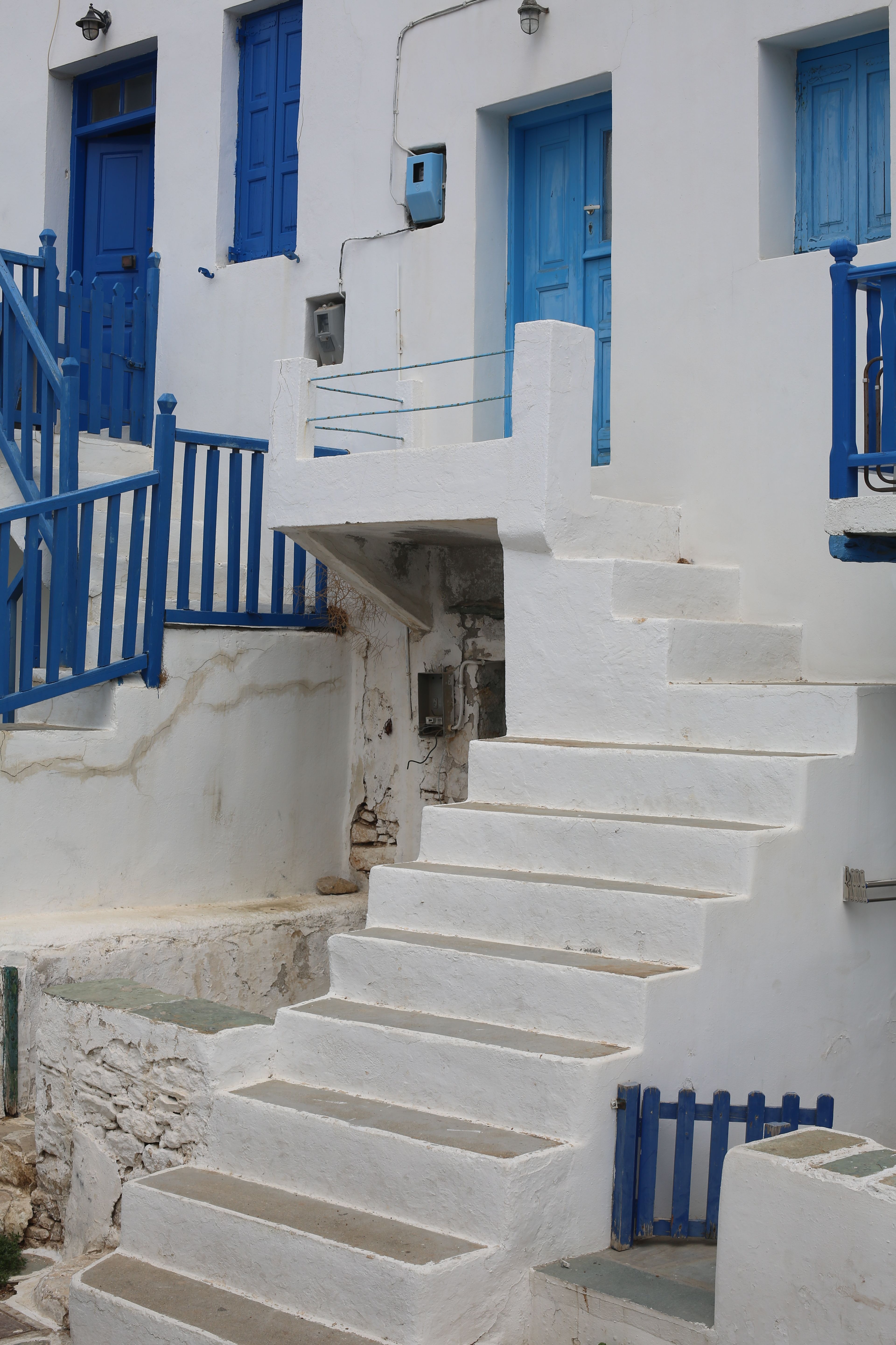 White Stairs and Blue Doors in Greek Island Setting · Free Stock Photo