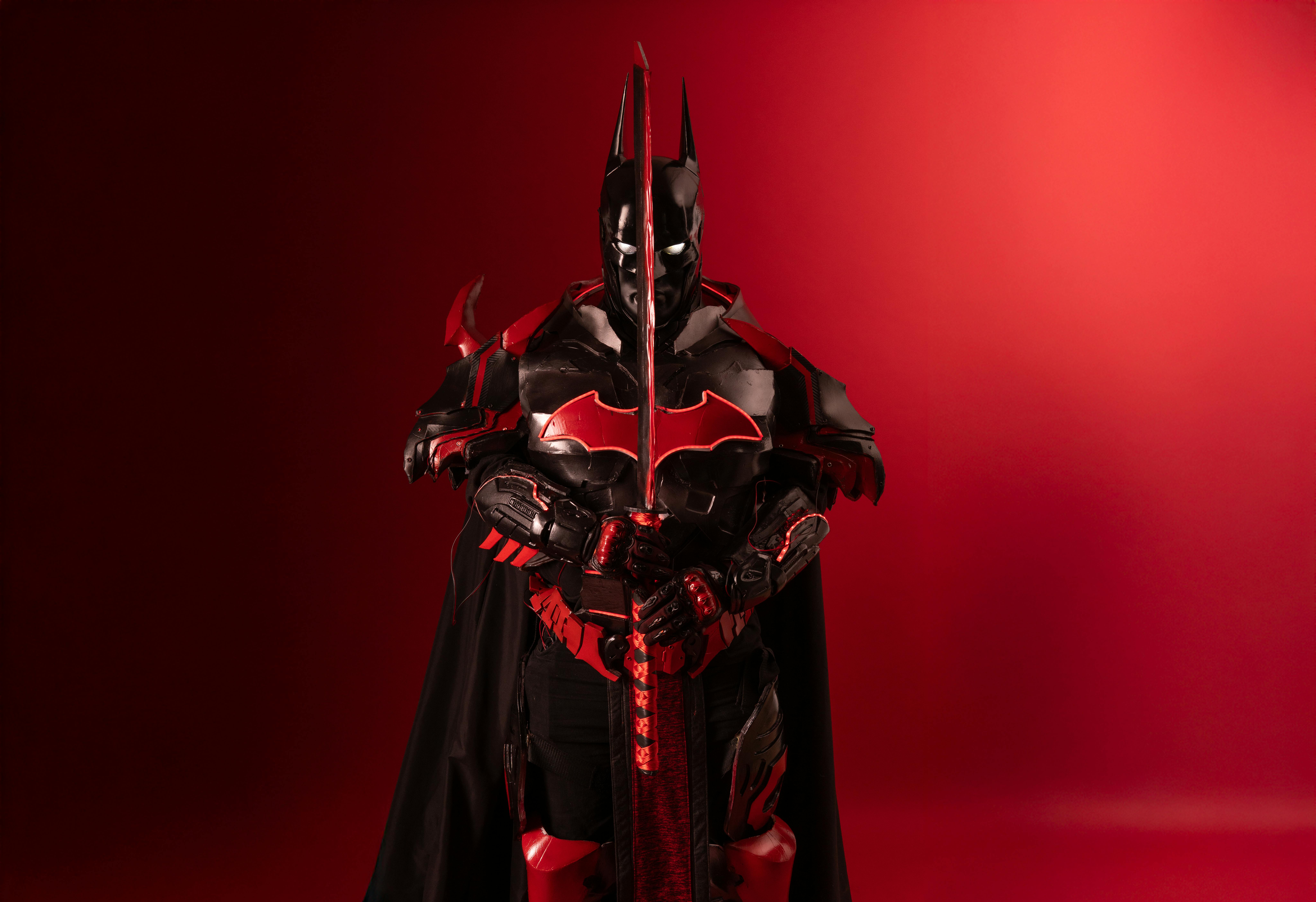 Intense Batman Cosplay Portrait with Red Armor · Free Stock Photo