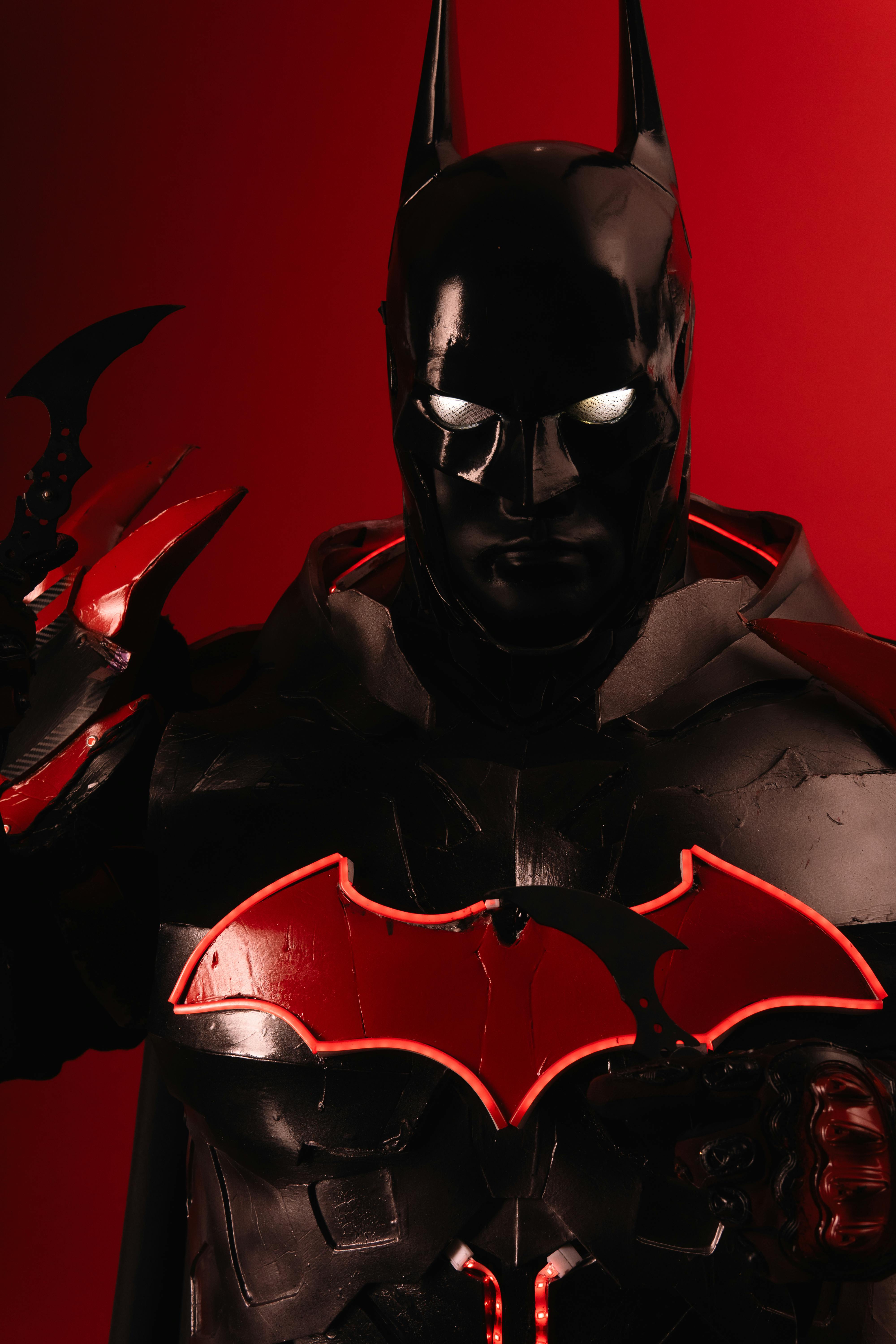Striking Batman Cosplay with Black and Red Armor · Free Stock Photo