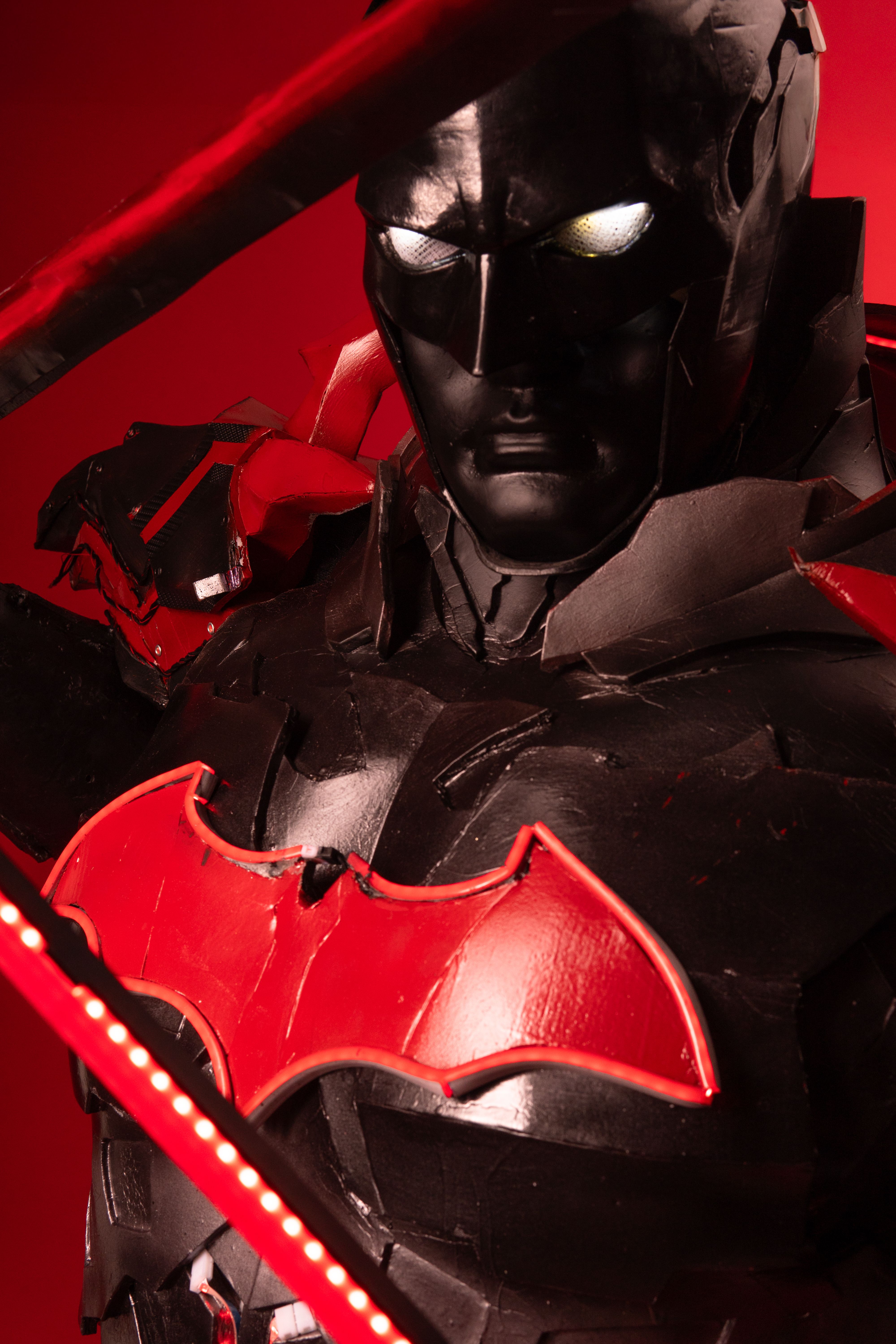 Intense Black and Red Cosplay Armor with Bat Emblem · Free Stock Photo