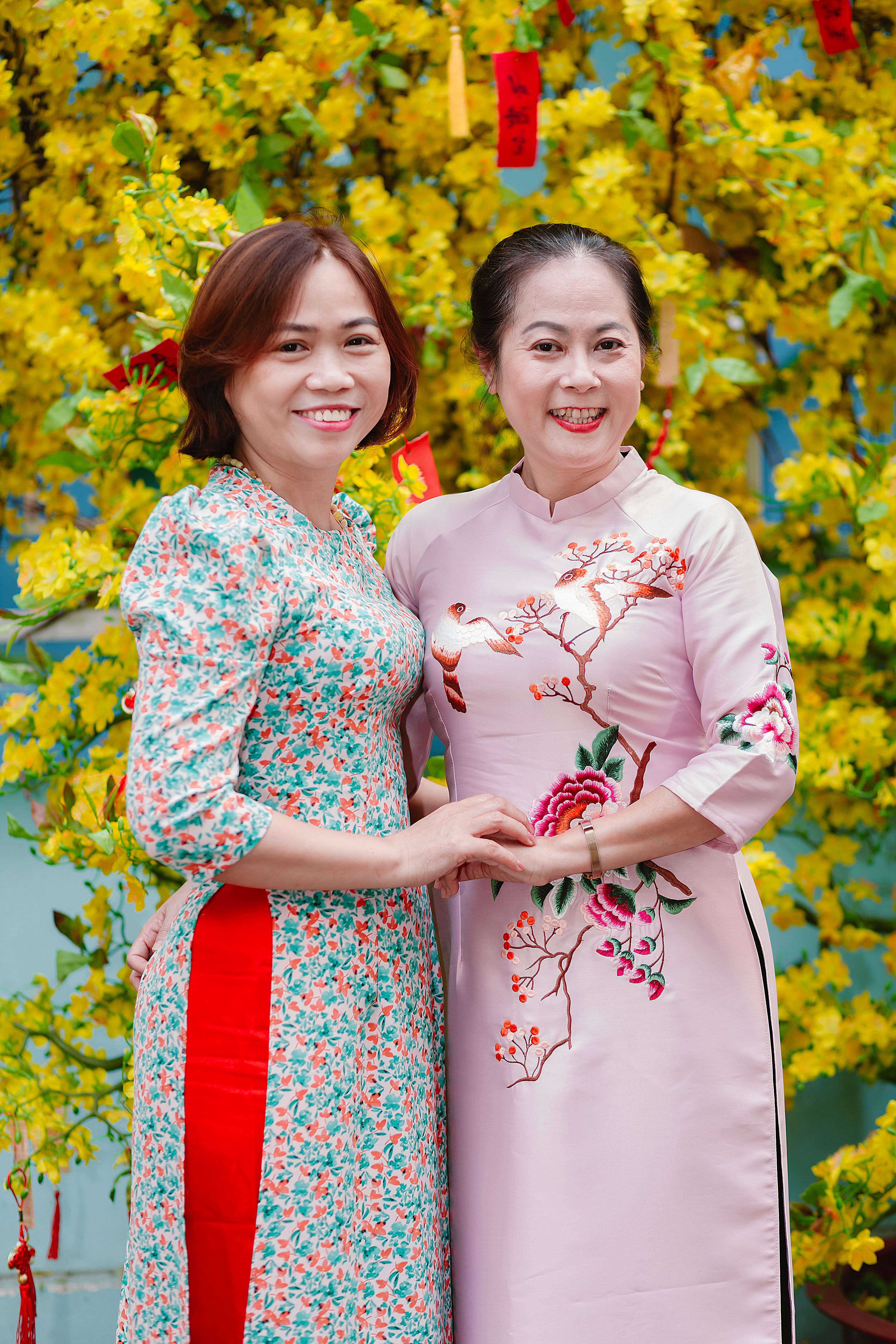 Women in Traditional Dresses During Spring Festival · Free Stock Photo