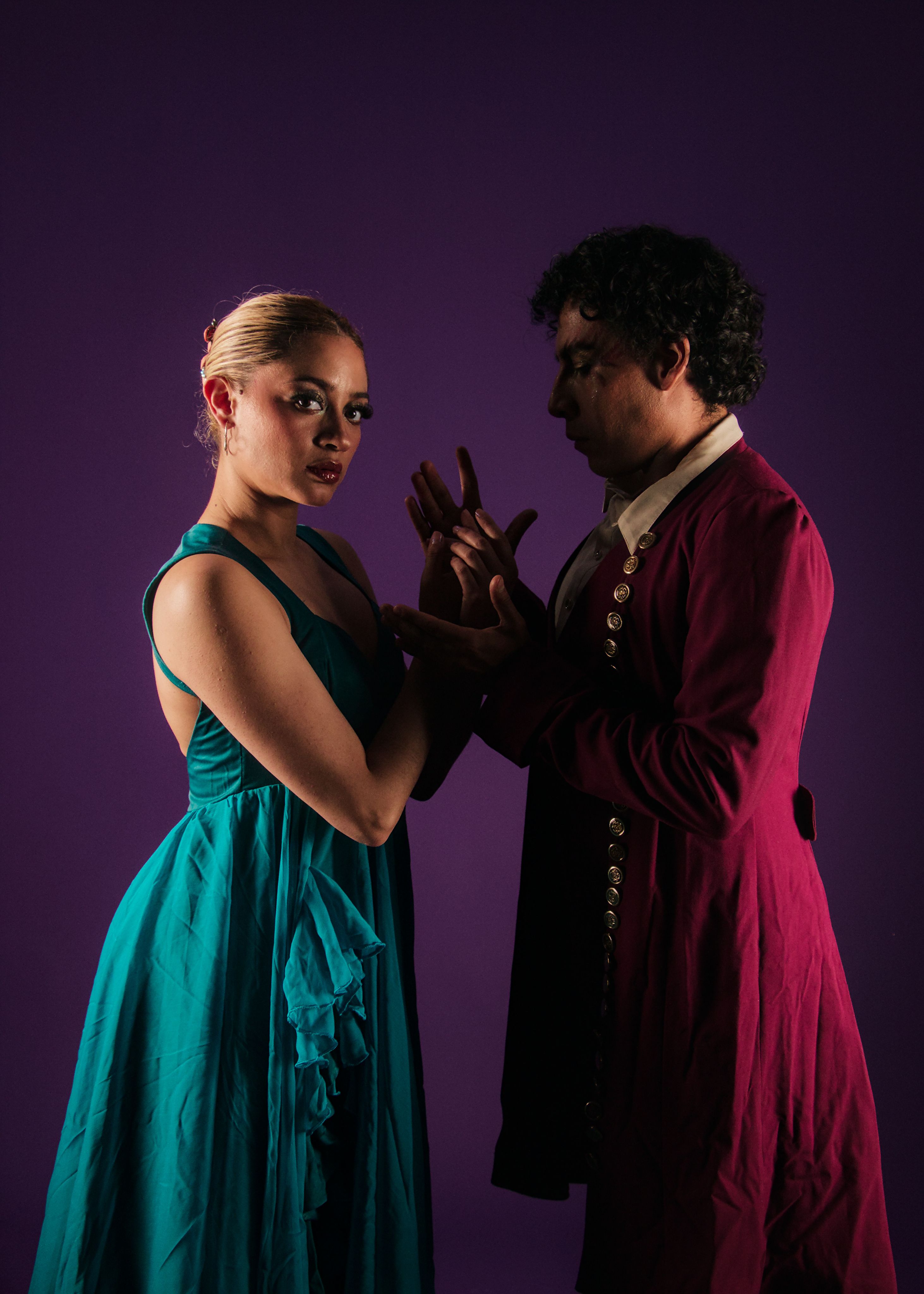 Elegant dance pose with theatrical costumes · Free Stock Photo