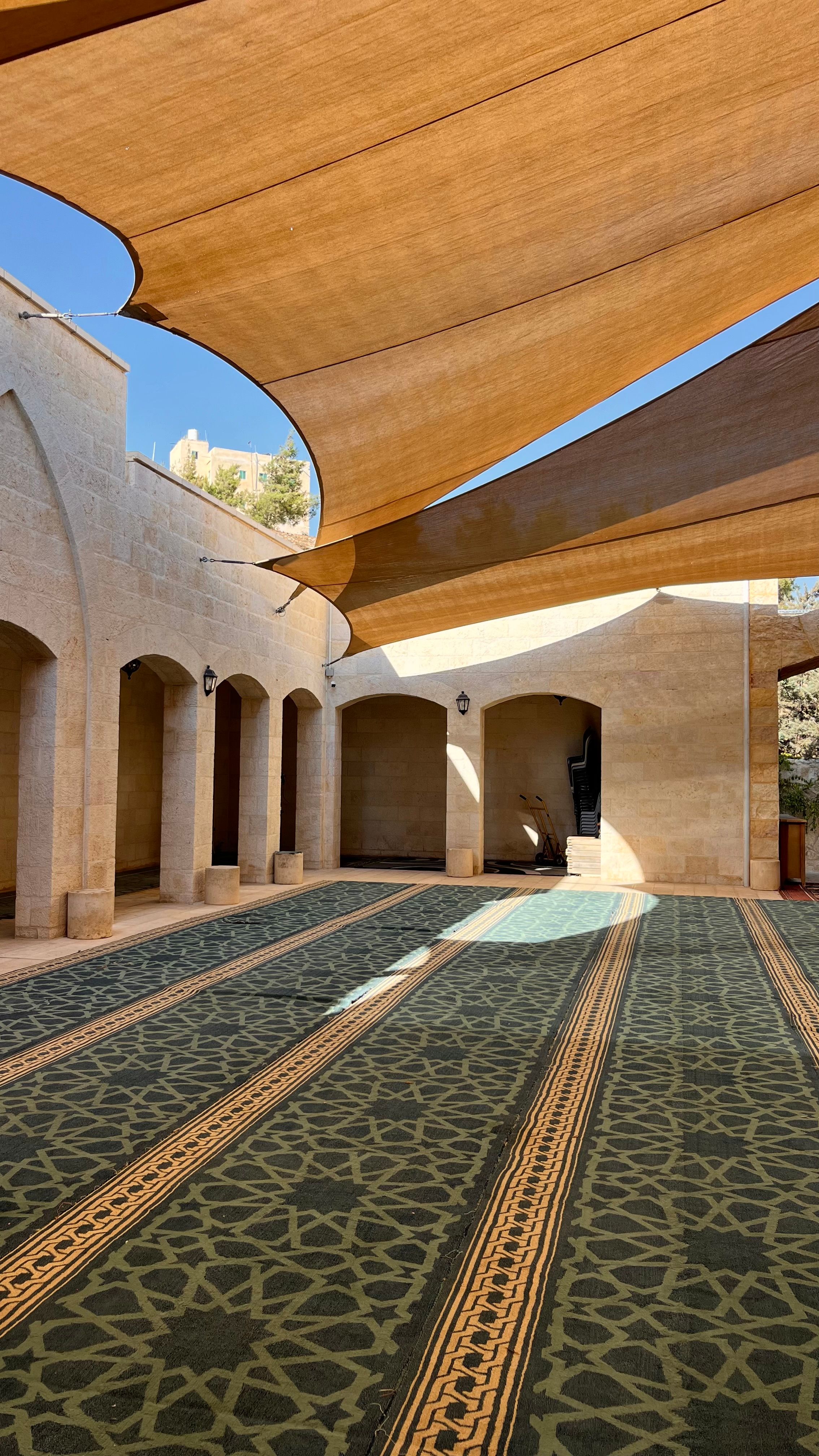 Peaceful Mosque Courtyard with Canopies in Jordan · Free Stock Photo