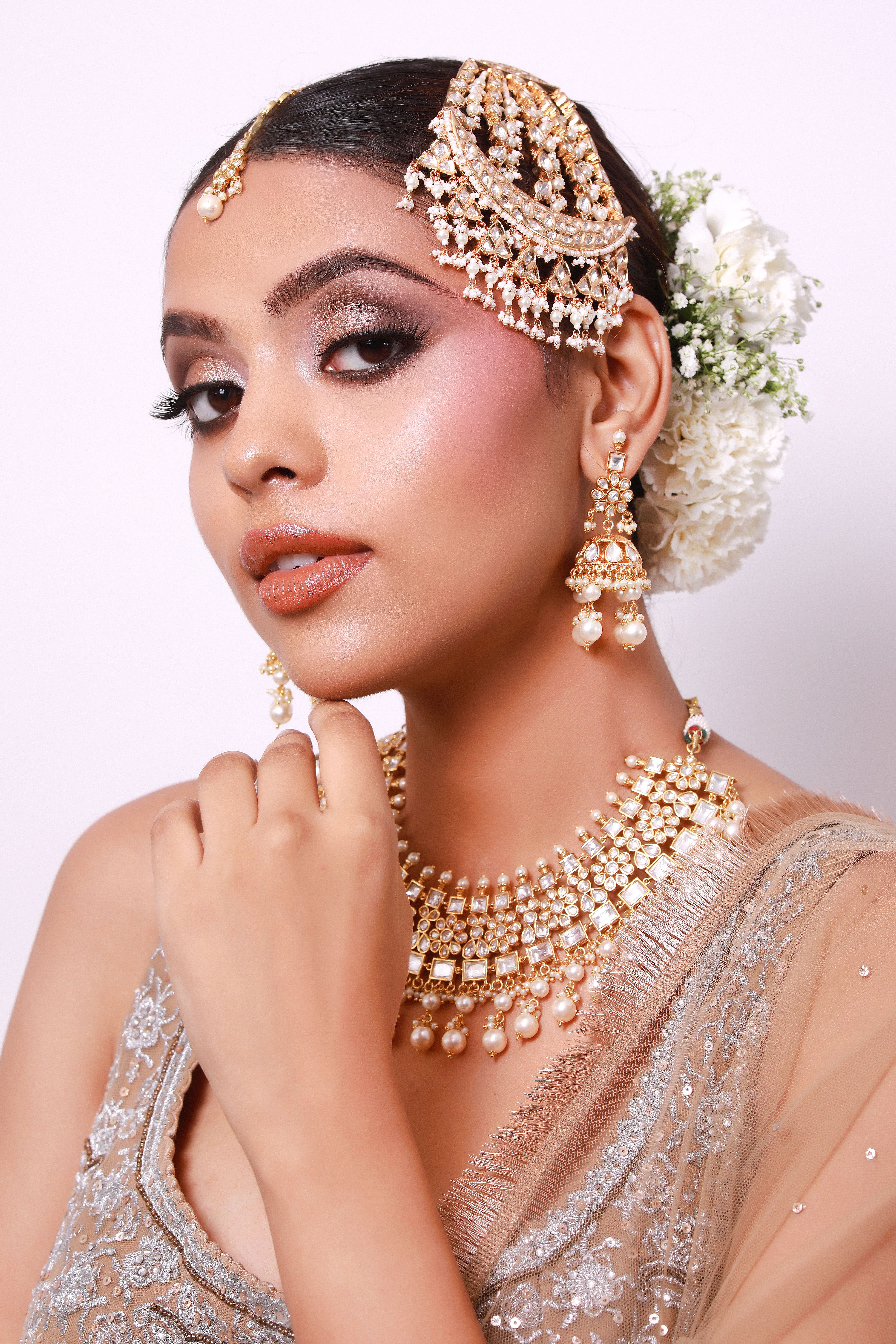 Elegant Indian Bride with Gold Jewelry · Free Stock Photo
