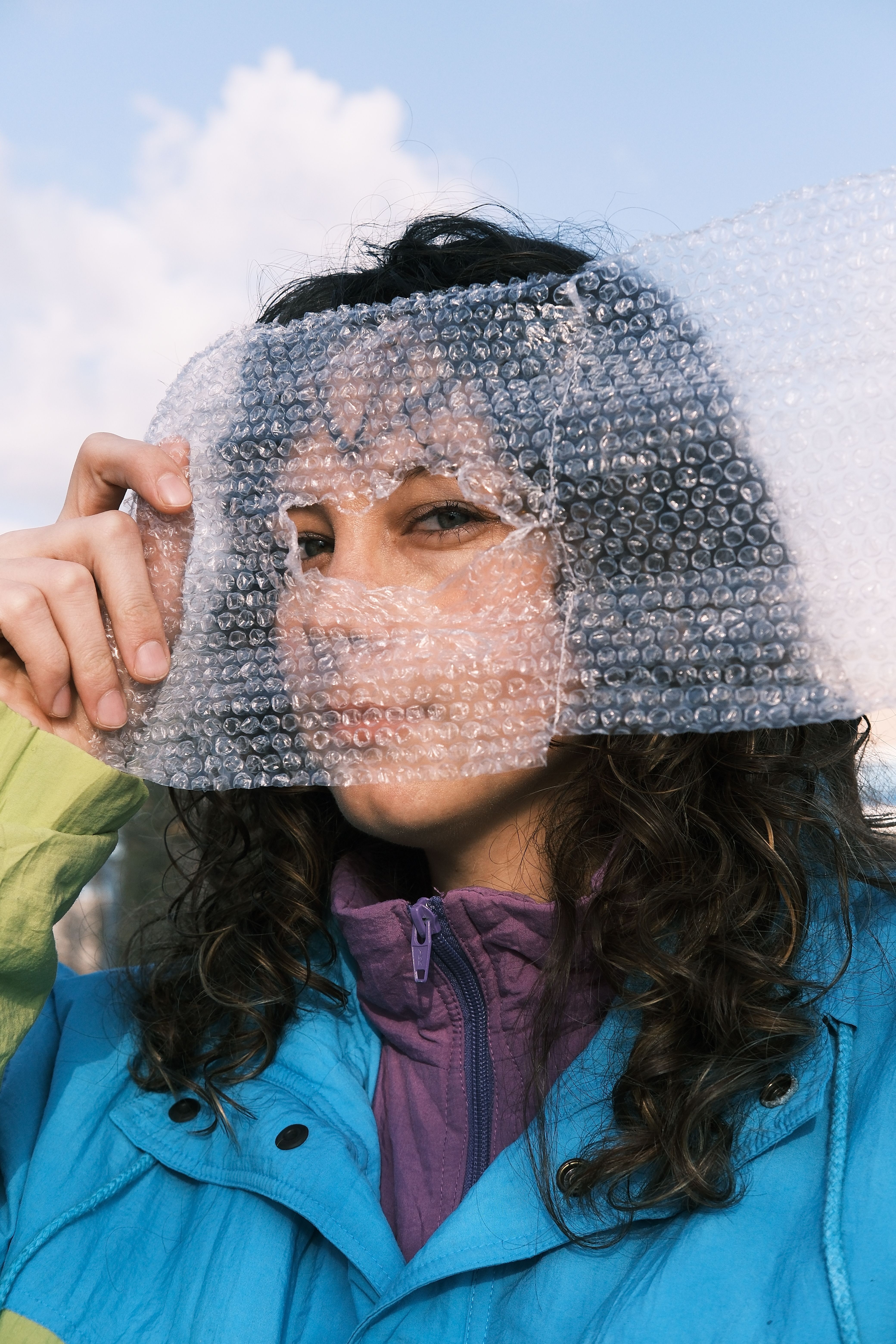 Creative Portrait with Bubble Wrap and Retro Jacket · Free Stock Photo