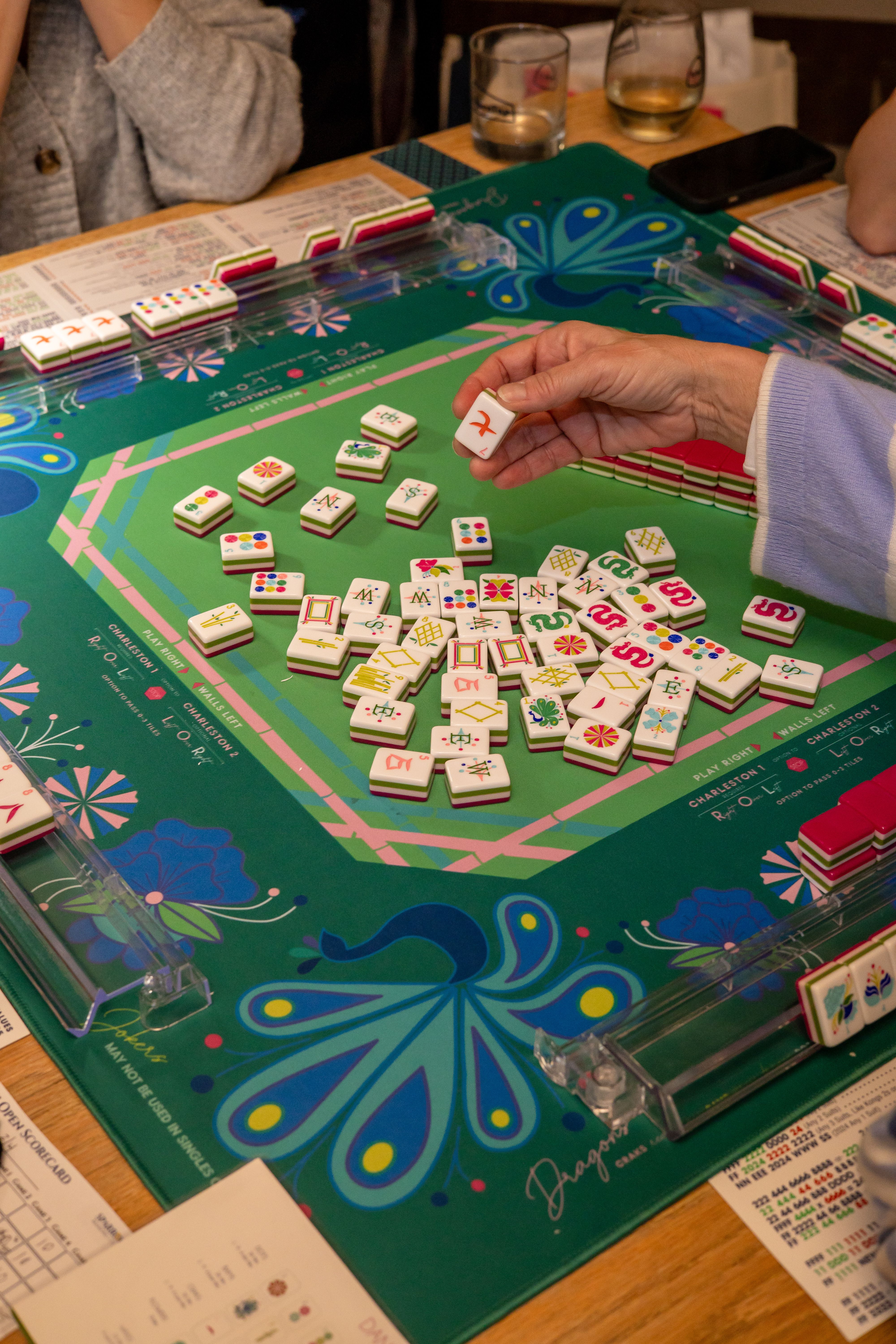 Mahjong Game Night on Peacock Design Table · Free Stock Photo