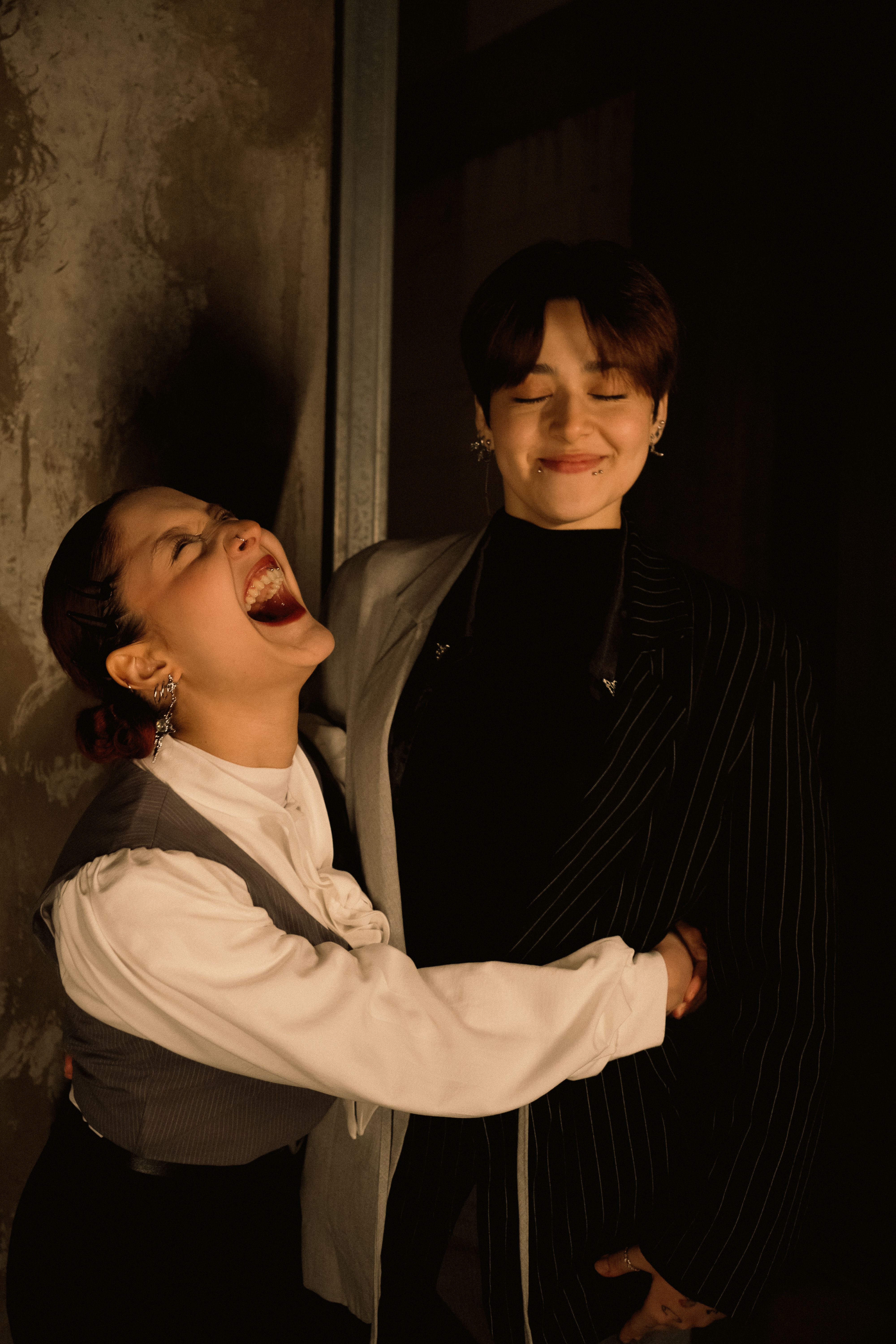 Joyful Moment of Two People Laughing · Free Stock Photo