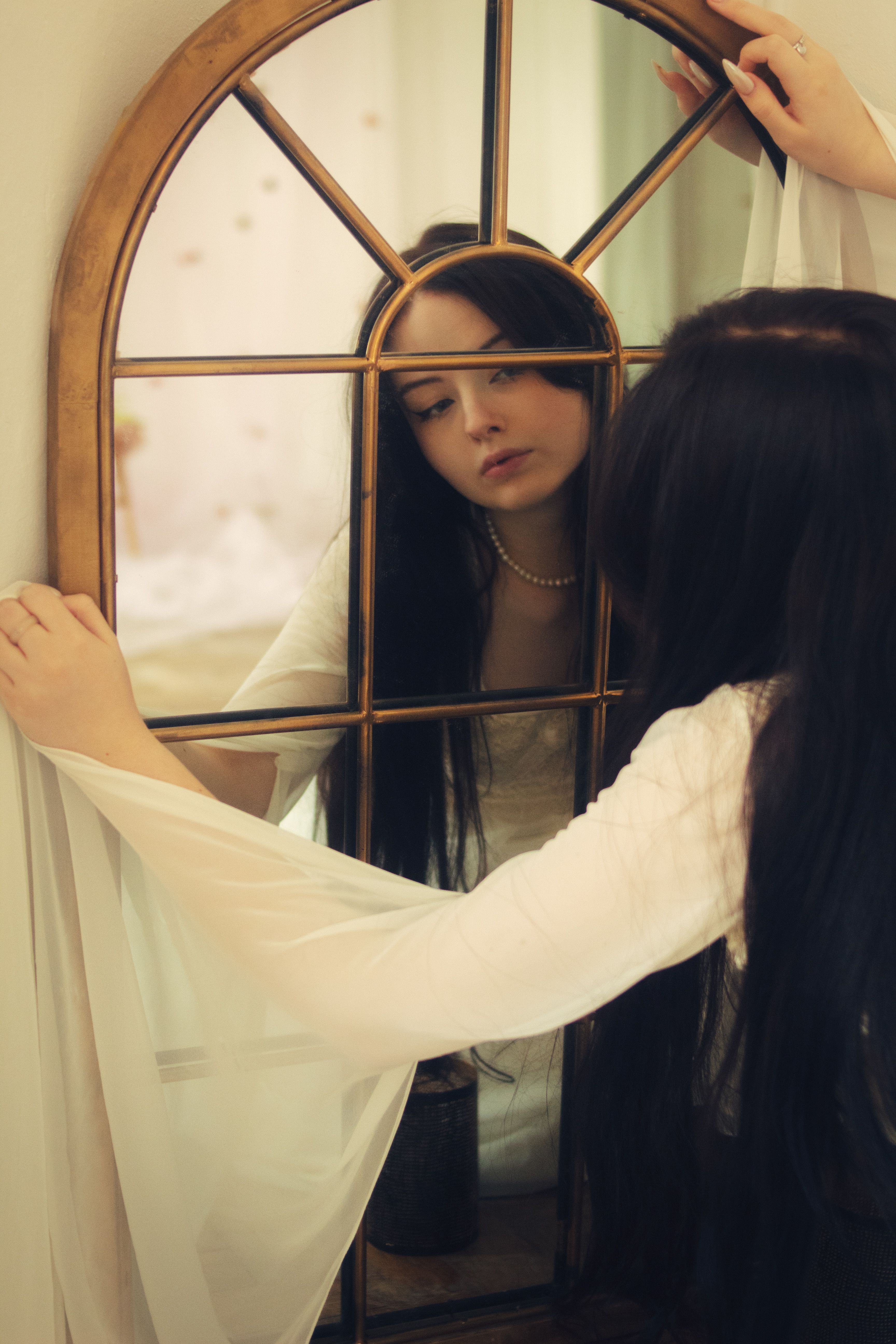 Elegant Woman Reflection in Arched Mirror · Free Stock Photo