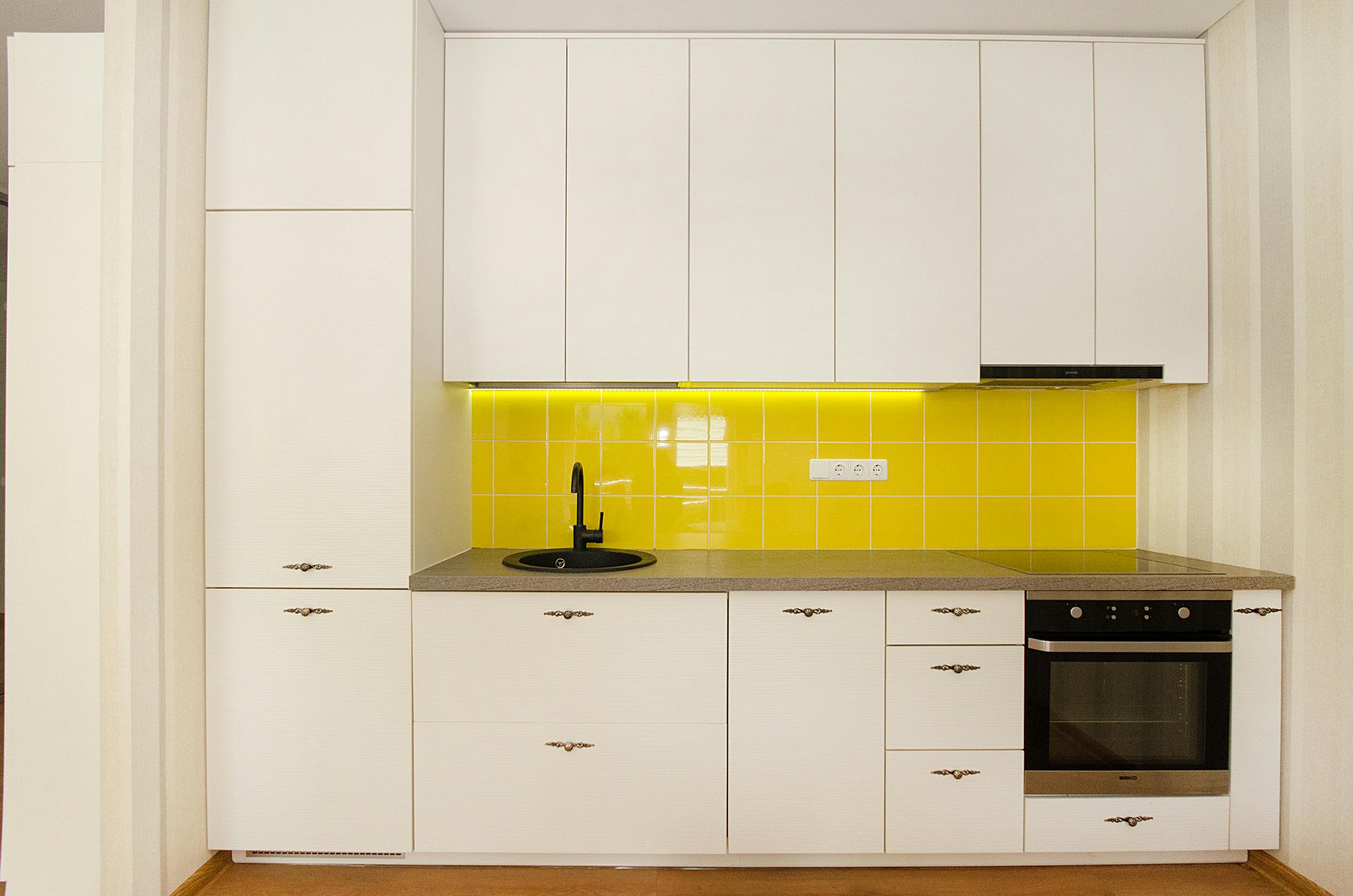 Bright Modern Kitchen with Yellow Backsplash · Free Stock Photo