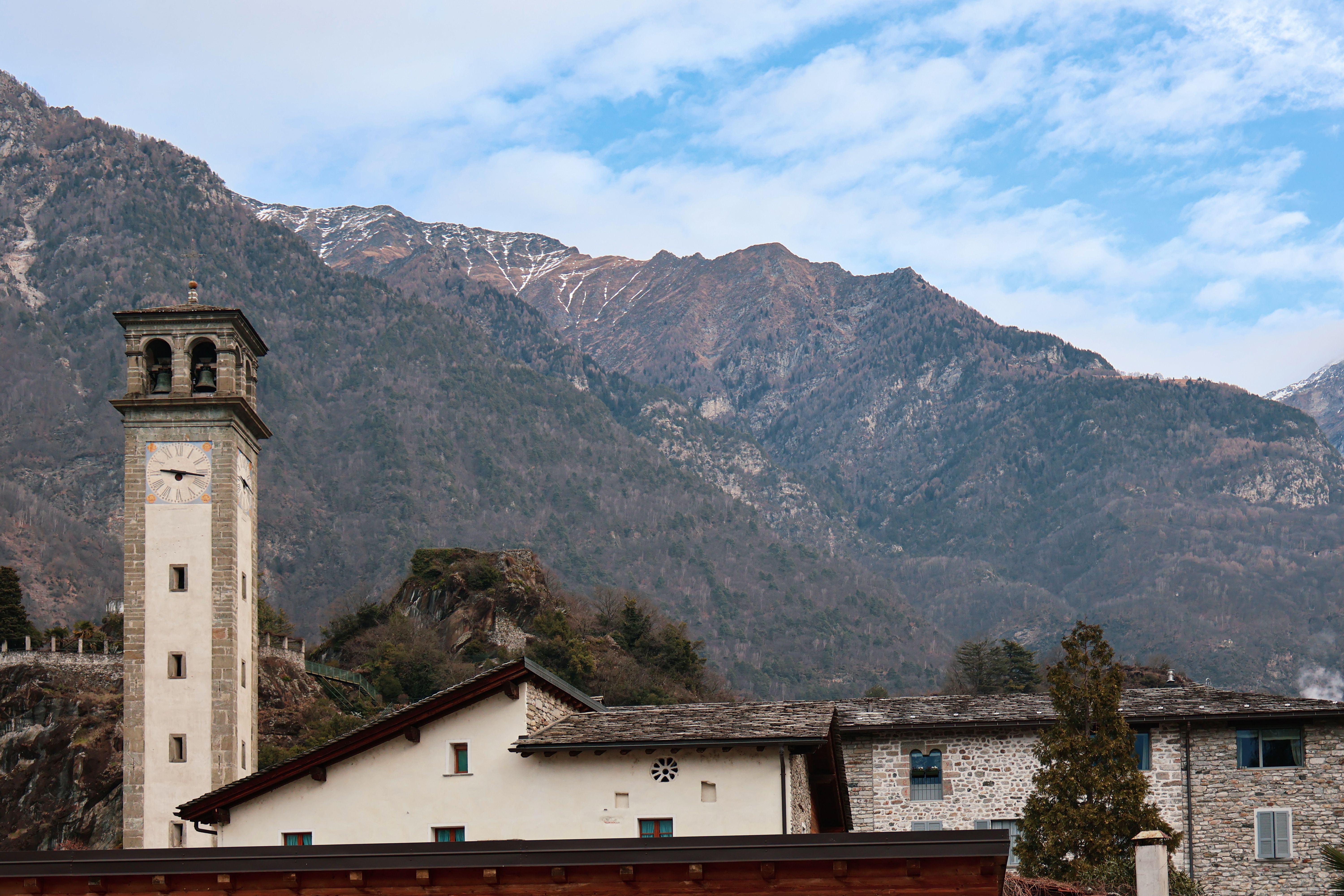 Scenic Alpine Village with Bell Tower · Free Stock Photo