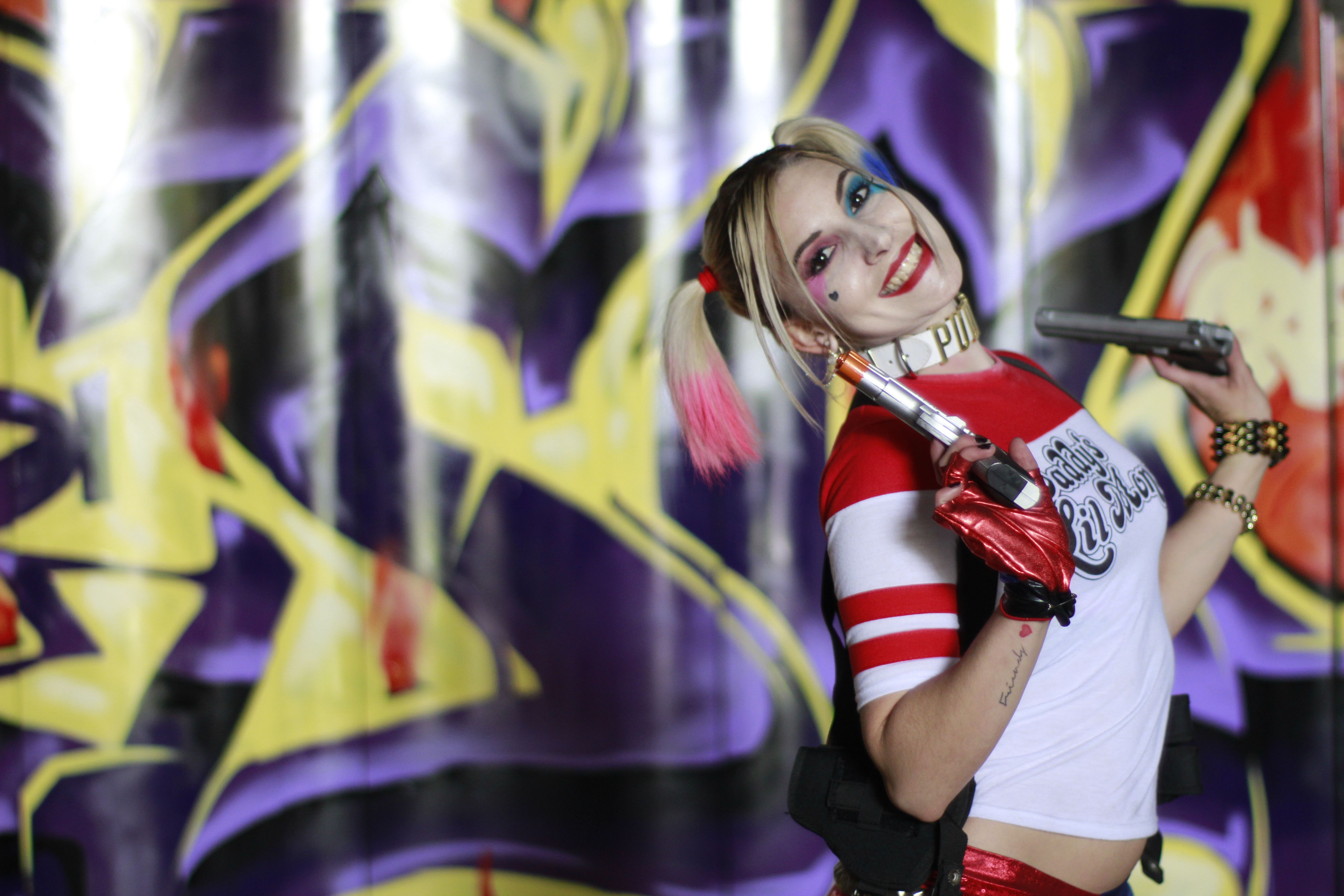 Cosplay Enthusiast Poses in Urban Graffiti Setting · Free Stock Photo