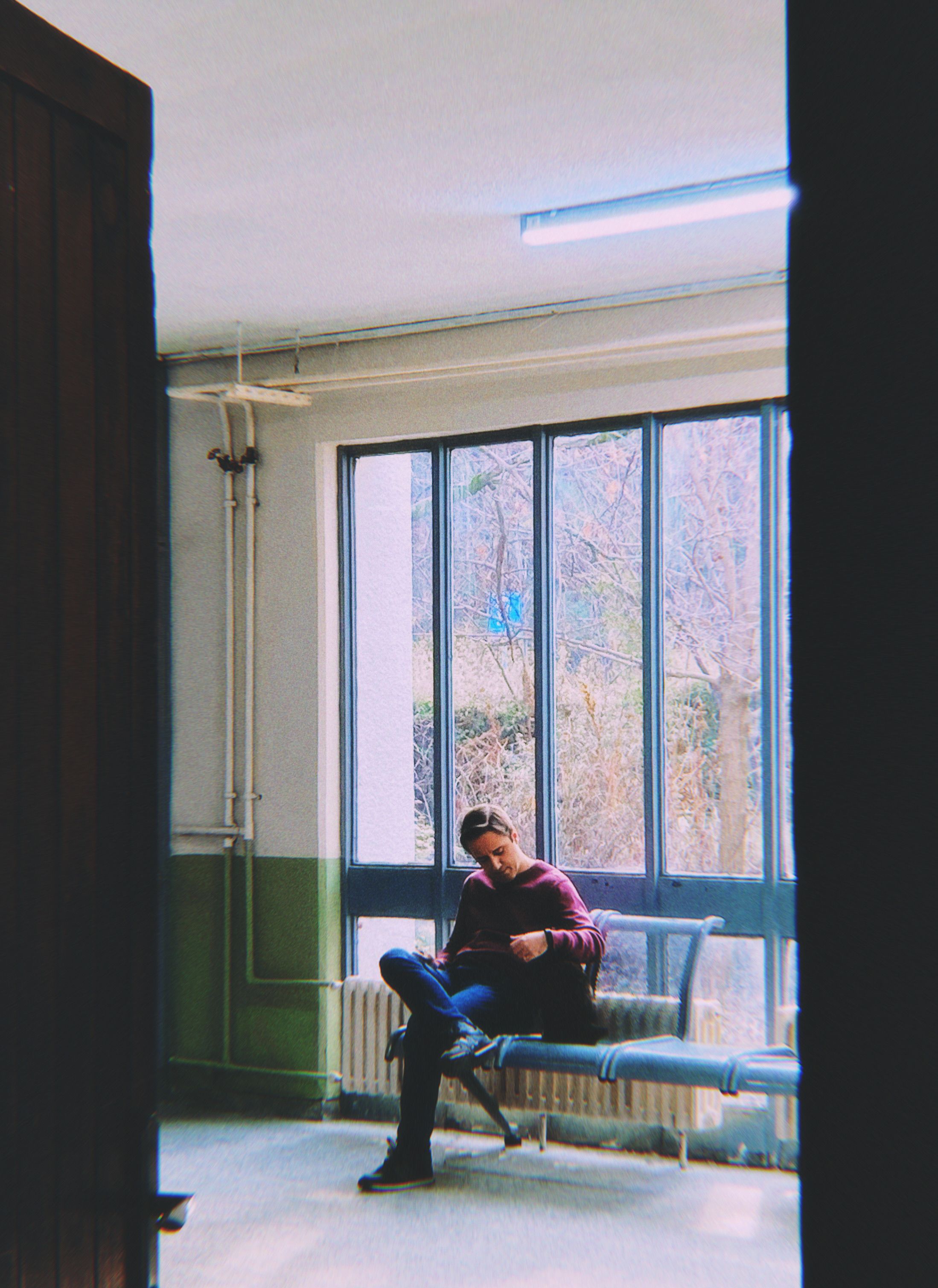 Person Sitting on Rocking Chair Inside Room · Free Stock Photo