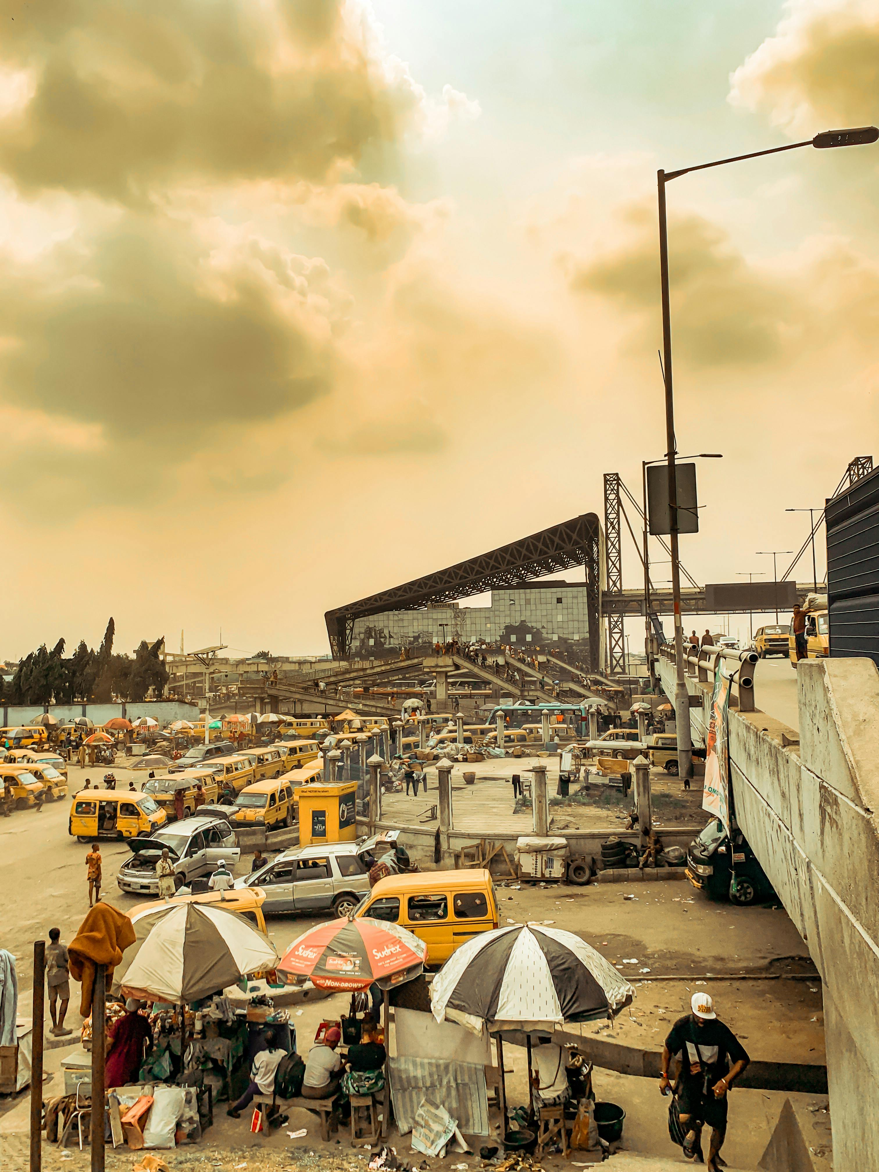 Bustling Lagos Street Market Scene at Sunset · Free Stock Photo