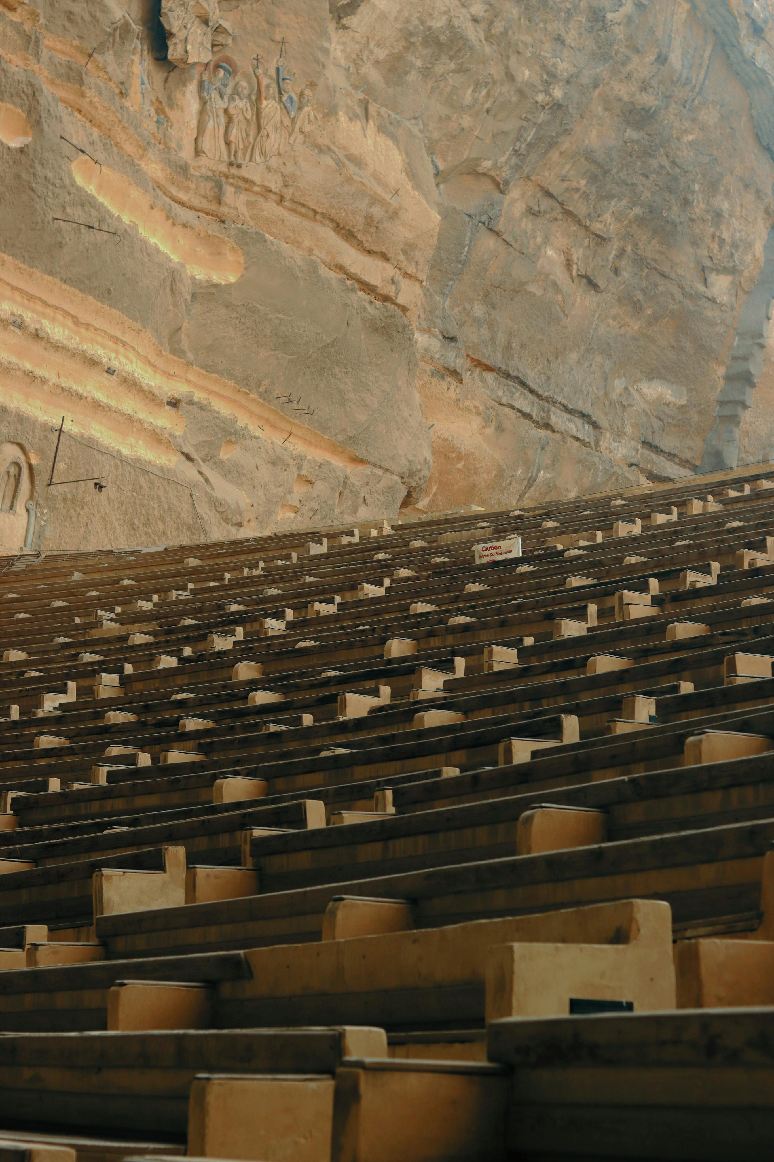 Ancient Amphitheater with Carved Stone Seats · Free Stock Photo