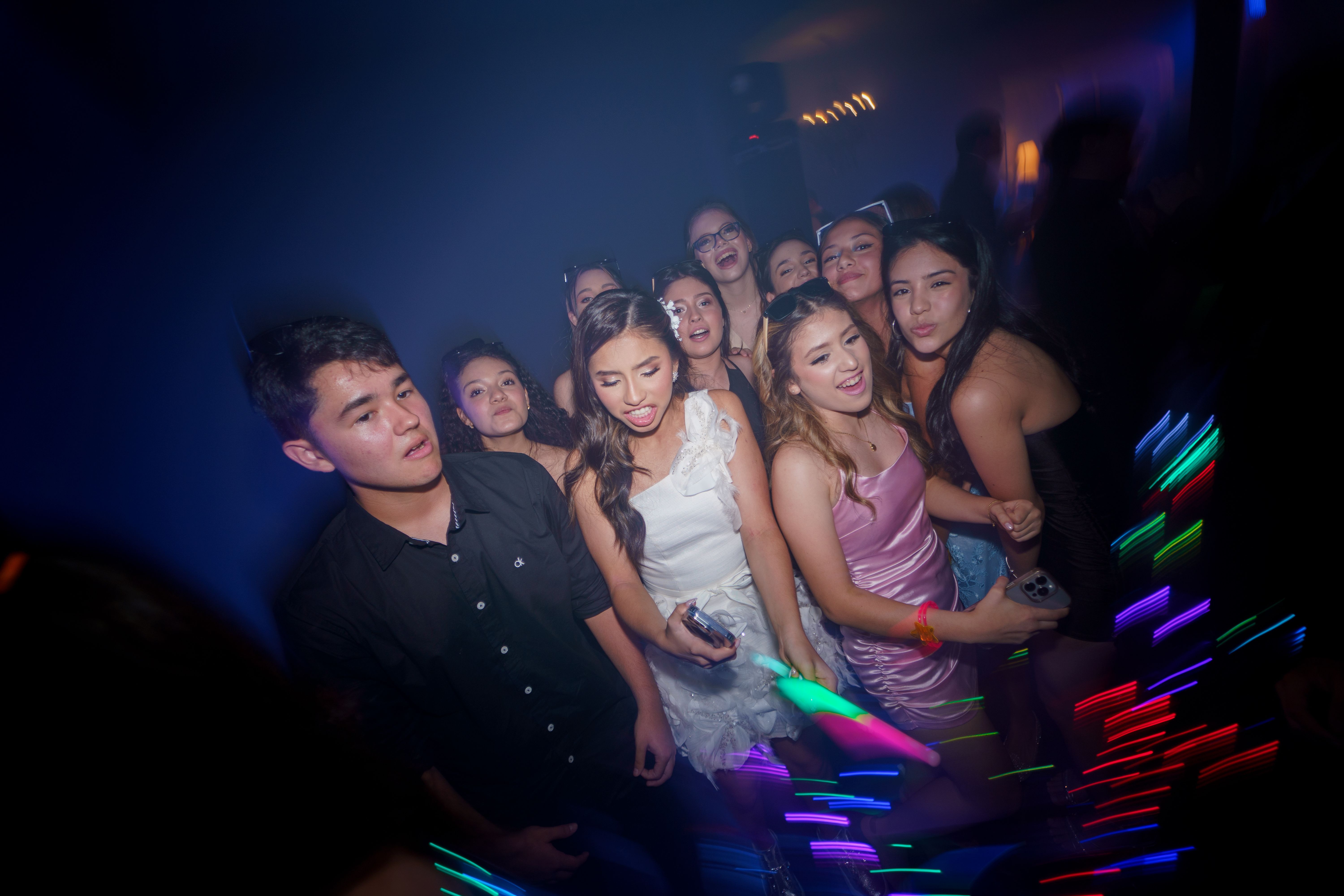 Young Adults Enjoying a Nightclub Party · Free Stock Photo