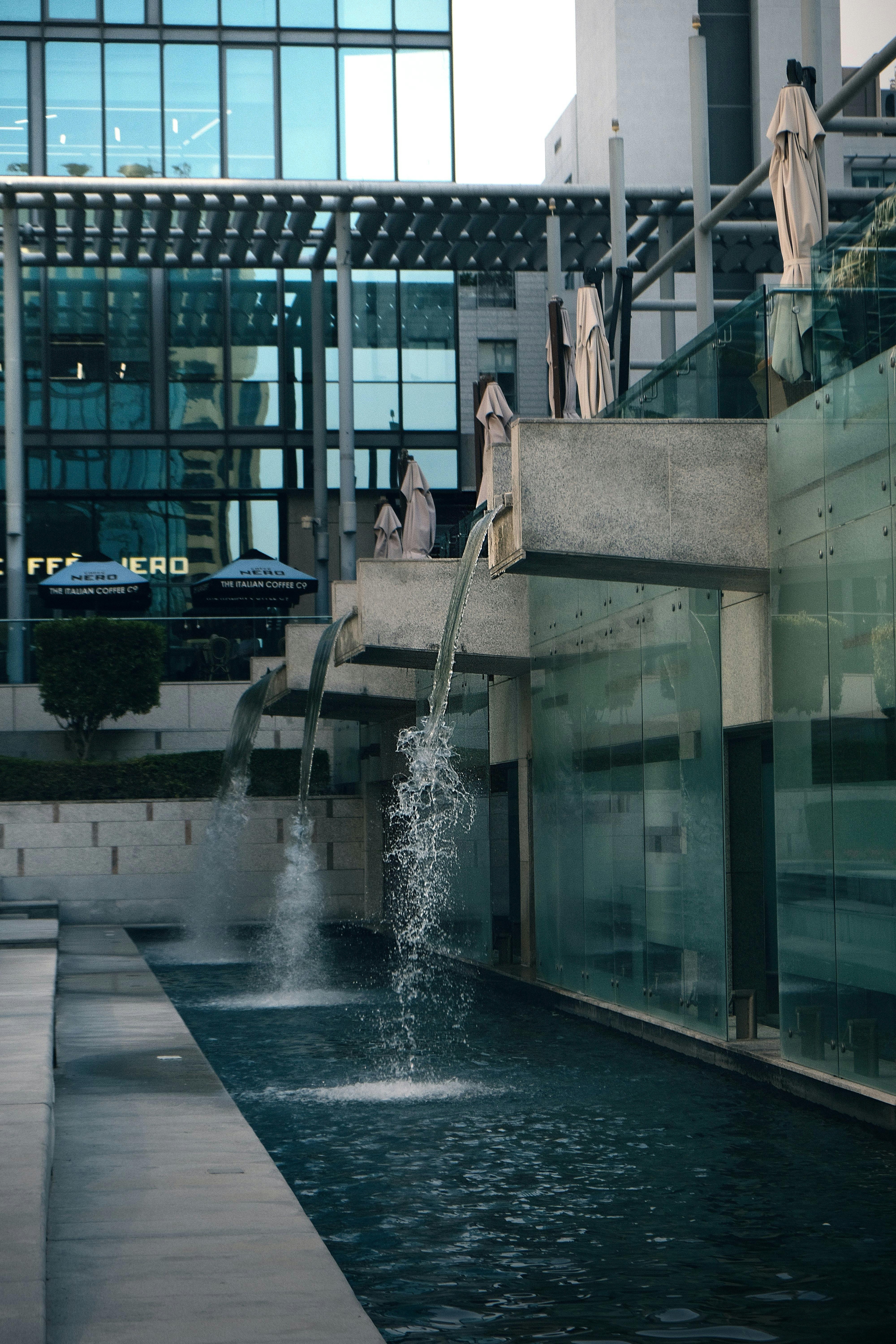 Modern Urban Oasis with Water Features · Free Stock Photo